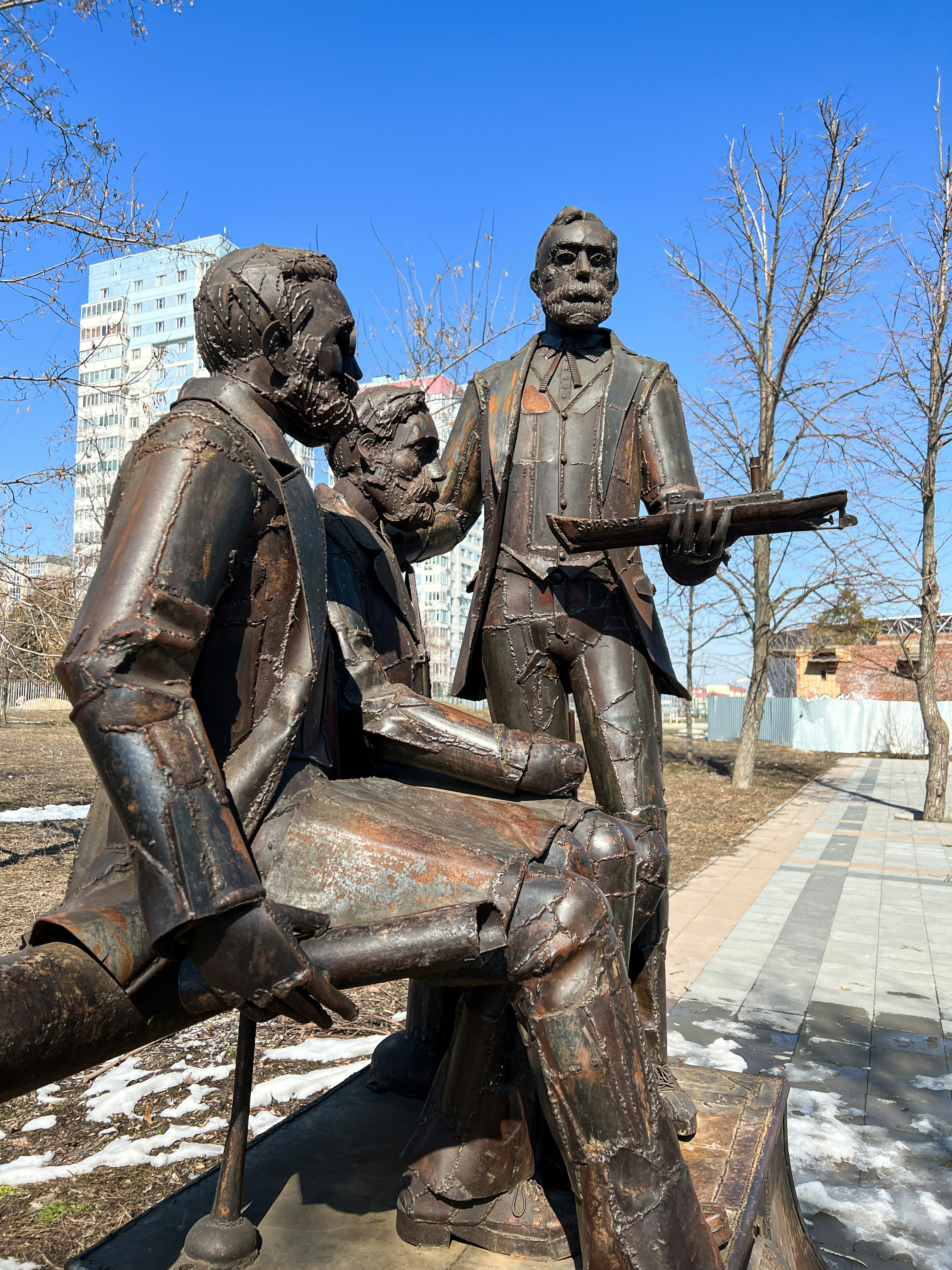 A statue of two men sitting next to each other photo – Free Volgograd ...