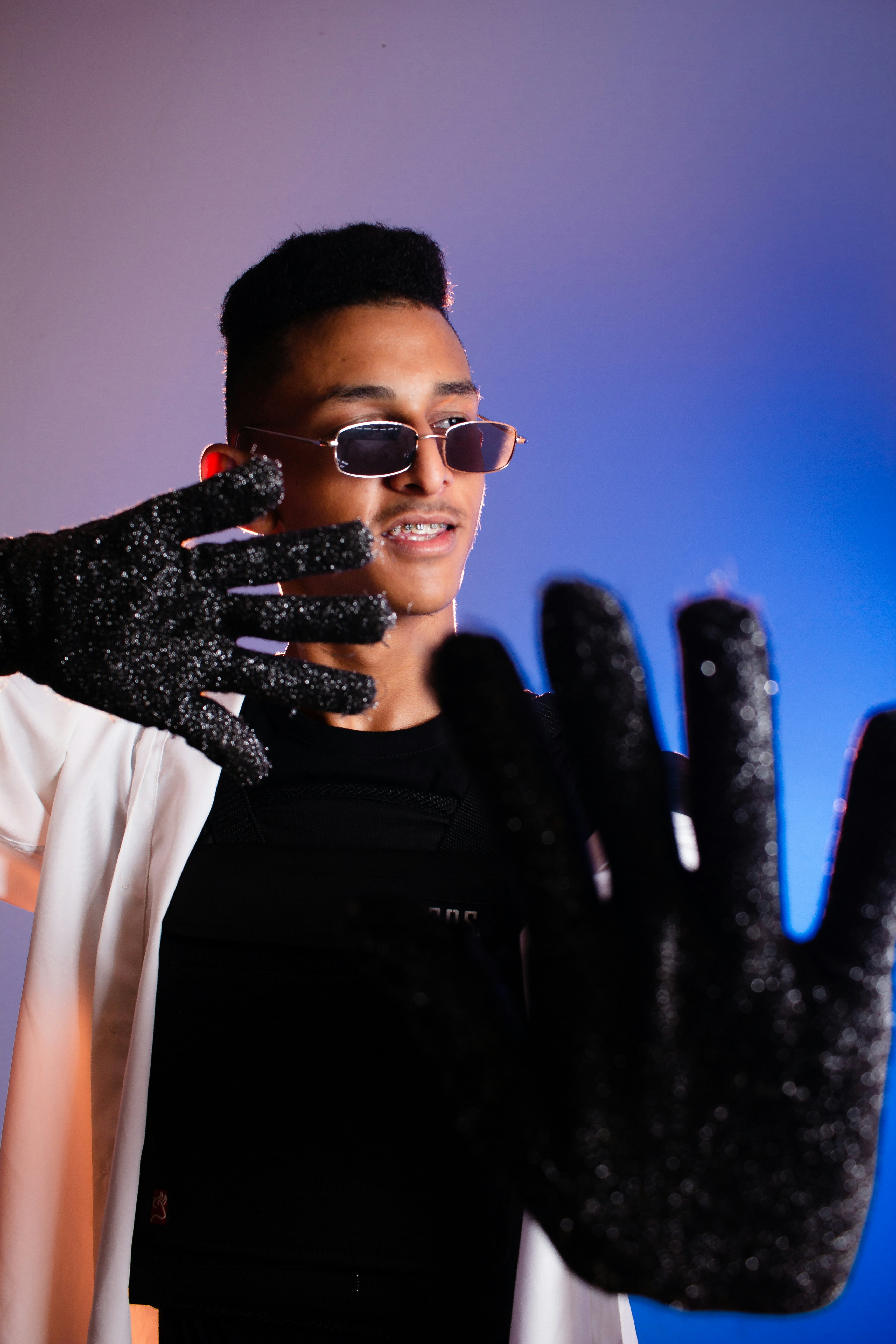 Glimmer in the Gloves: A Portrait of Confidence
