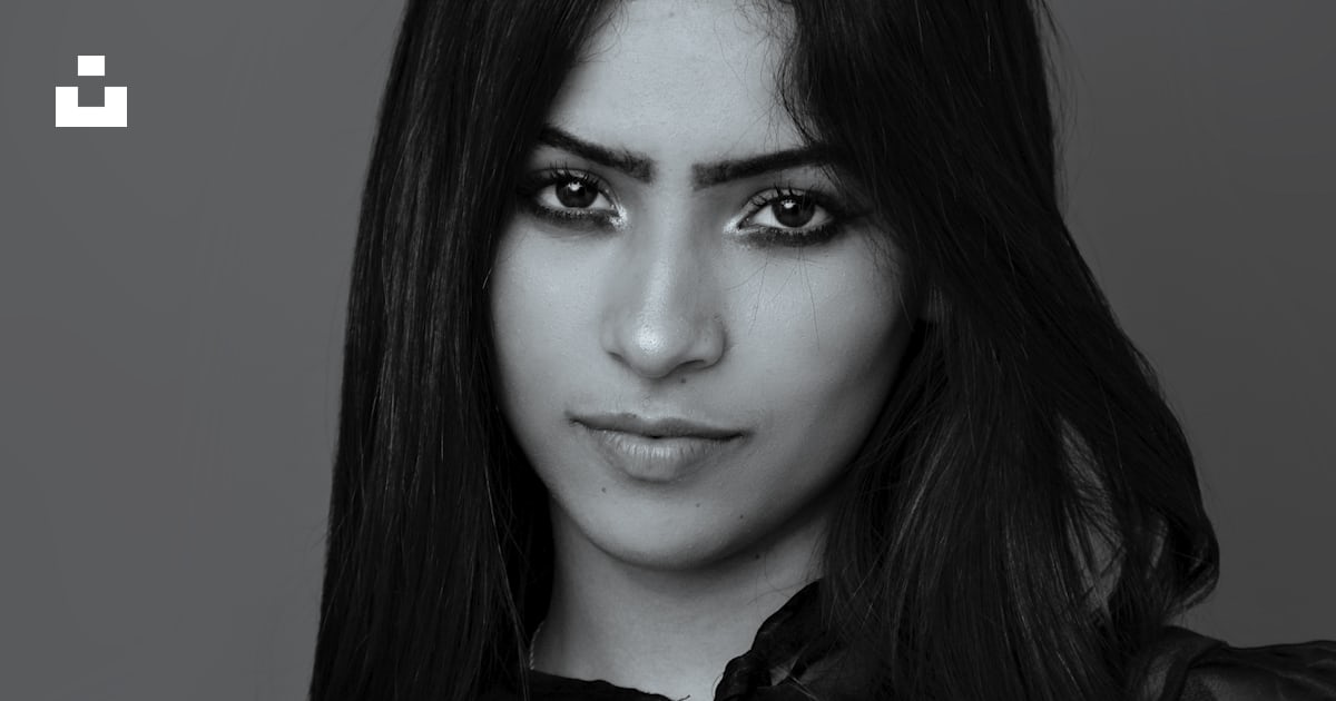 A Woman In A Sheer Shirt Posing For A Picture Photo Free Grey Image On Unsplash