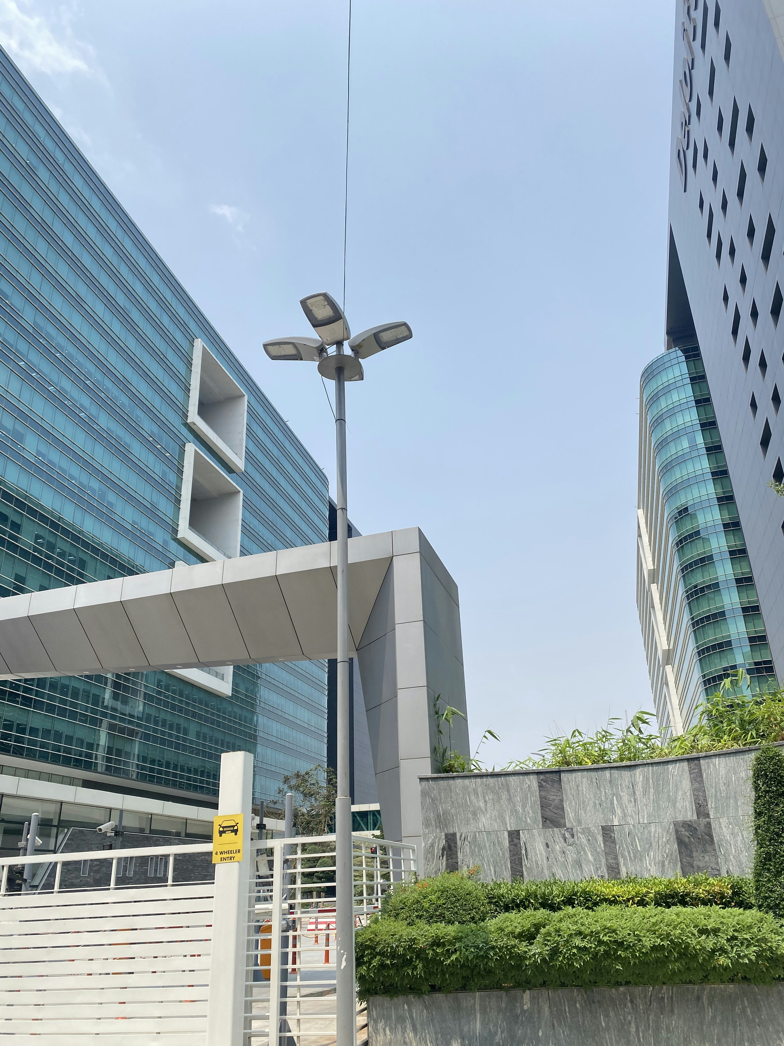 A street light in front of a tall building photo – Free Hyderabad Image ...