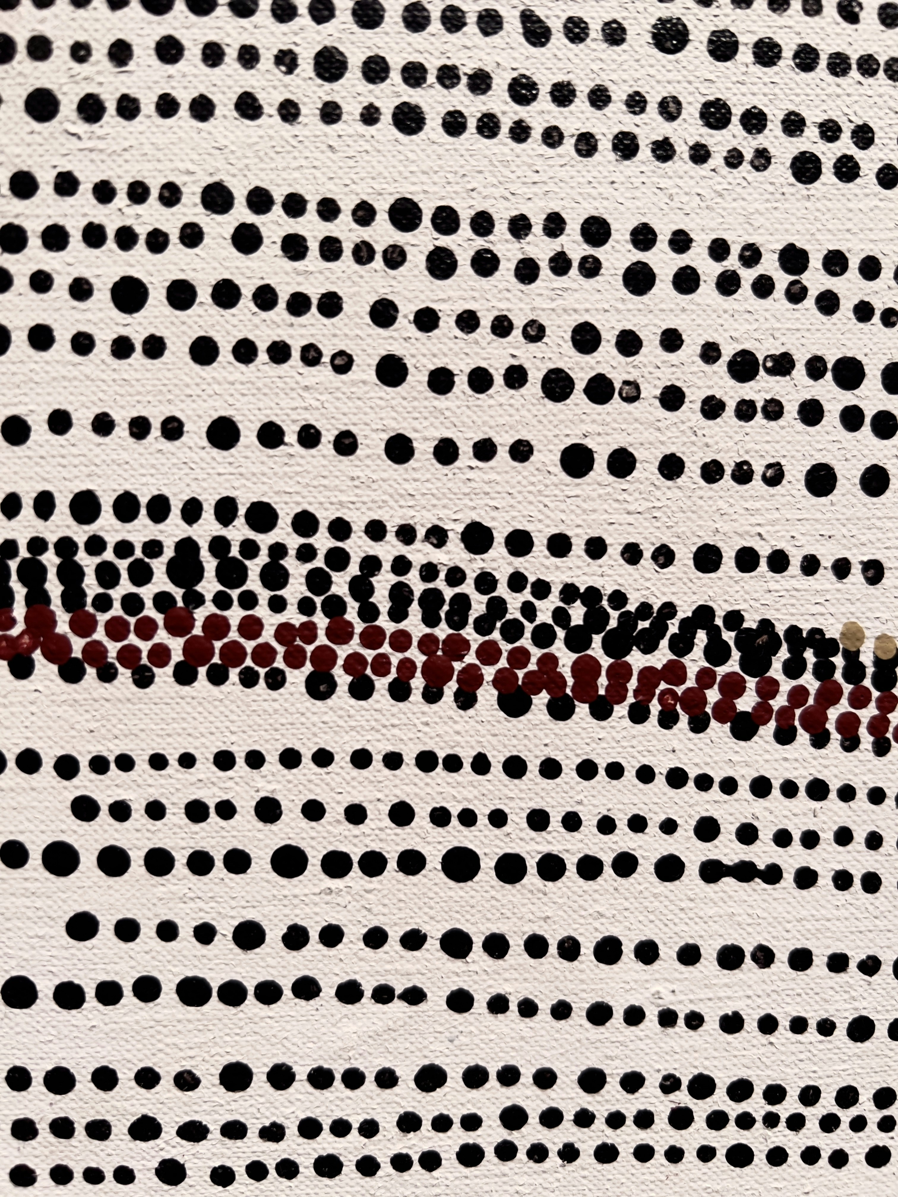 Dotted Rhythm: A Textile Pattern in Soft Pink with a Central Red Accent