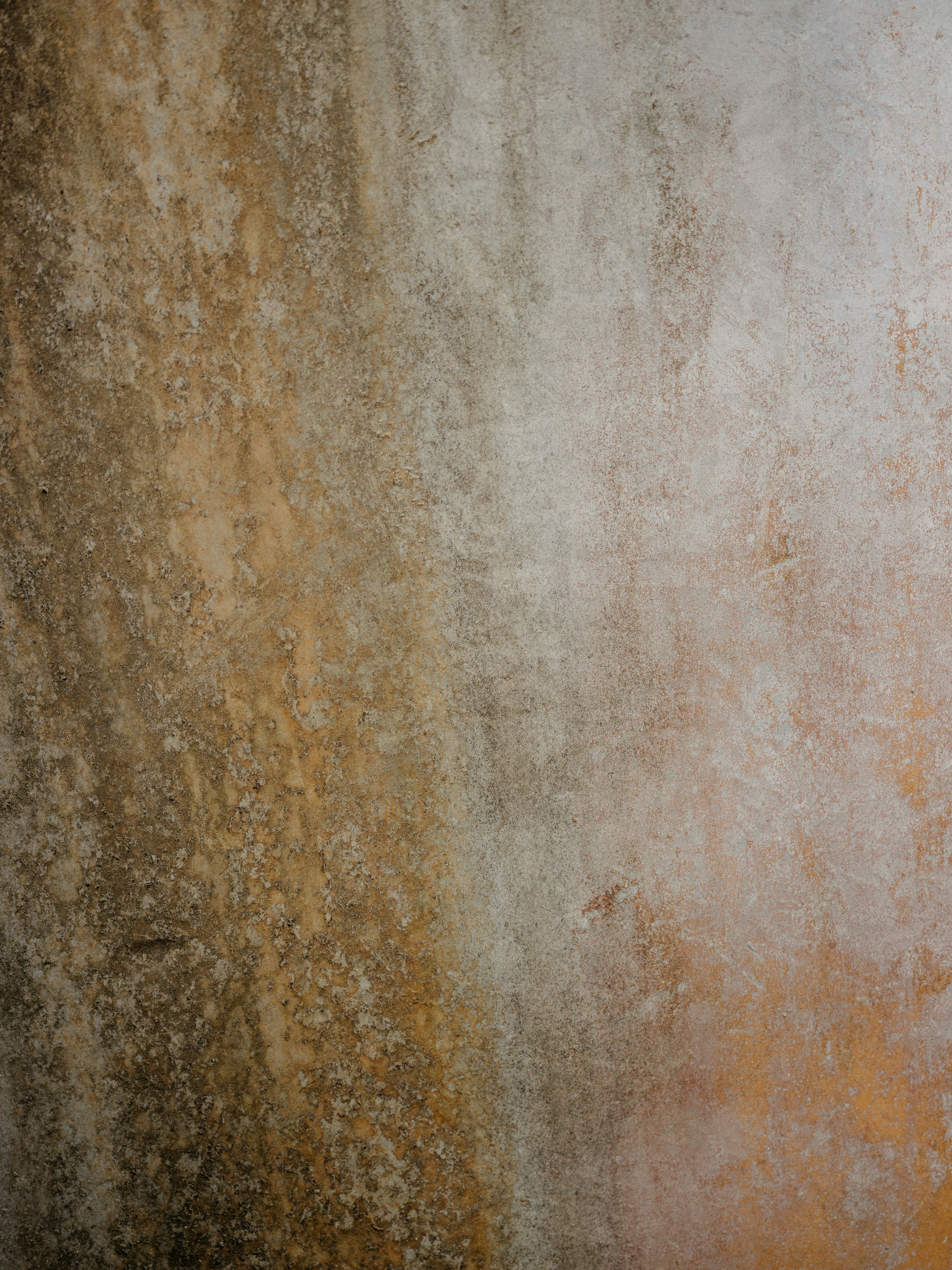 An abstract composition of weathered surfaces showcasing a blend of earthy tones and textures. Ideal for use as a background or artistic inspiration.