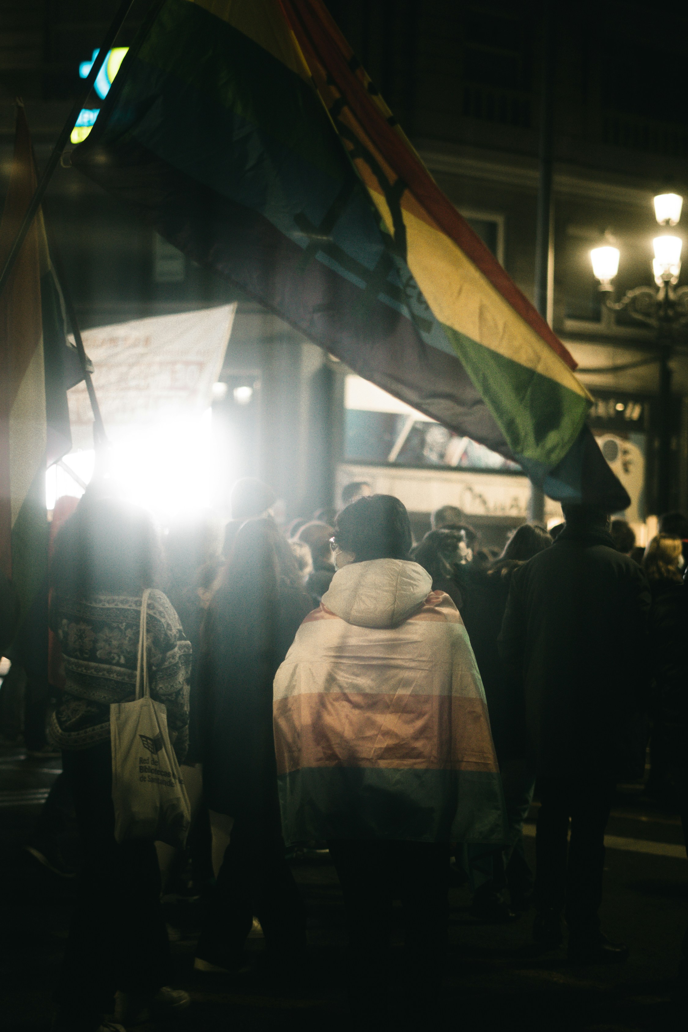 Under the Rainbow Banner: Nighttime March and Pride Flag
