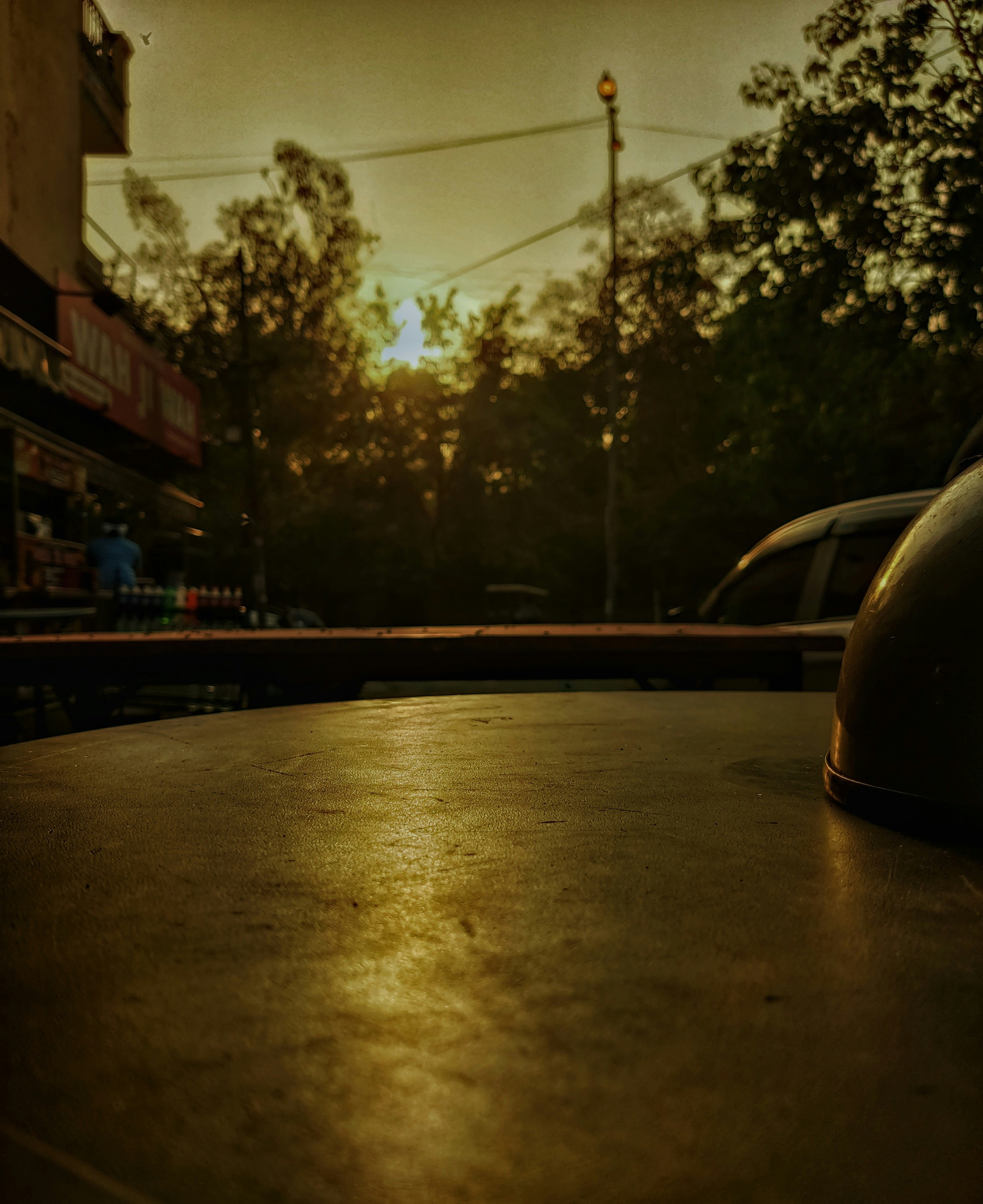 Dusk Glow on a Weathered Café Table
