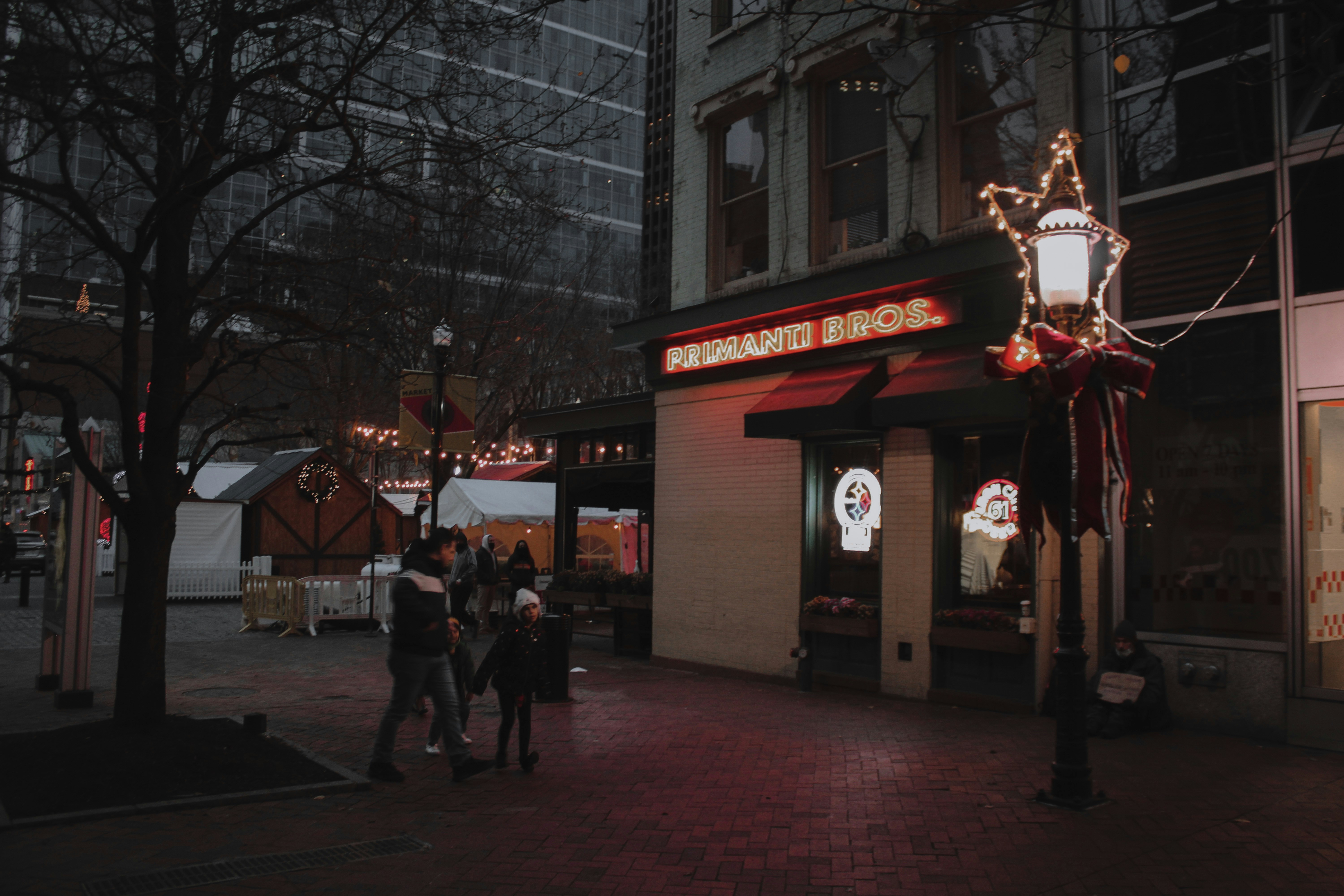 Warm Street Lanterns Beneath Holiday Lights