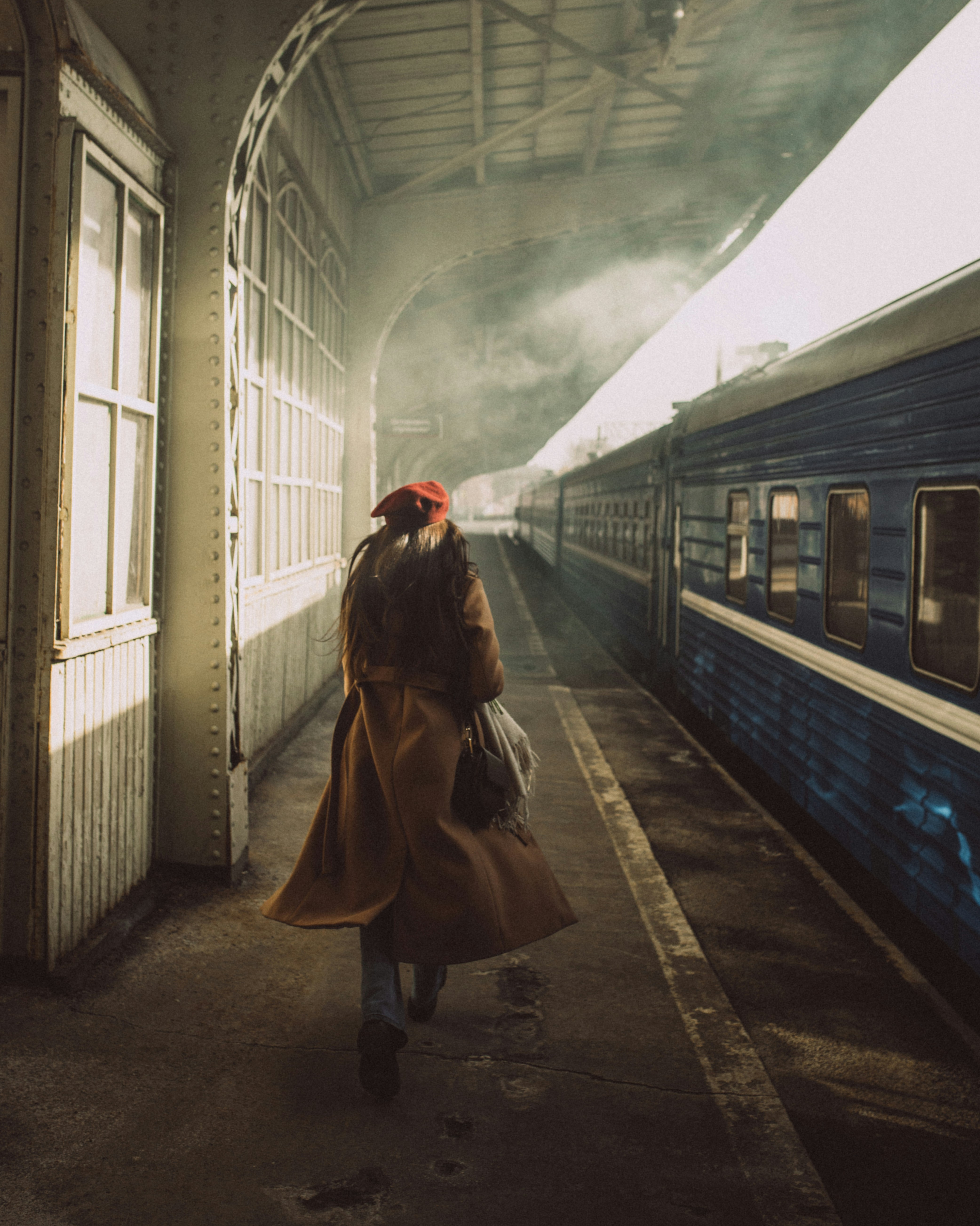 Red Beret Crossing a Steam-Fogged Platform