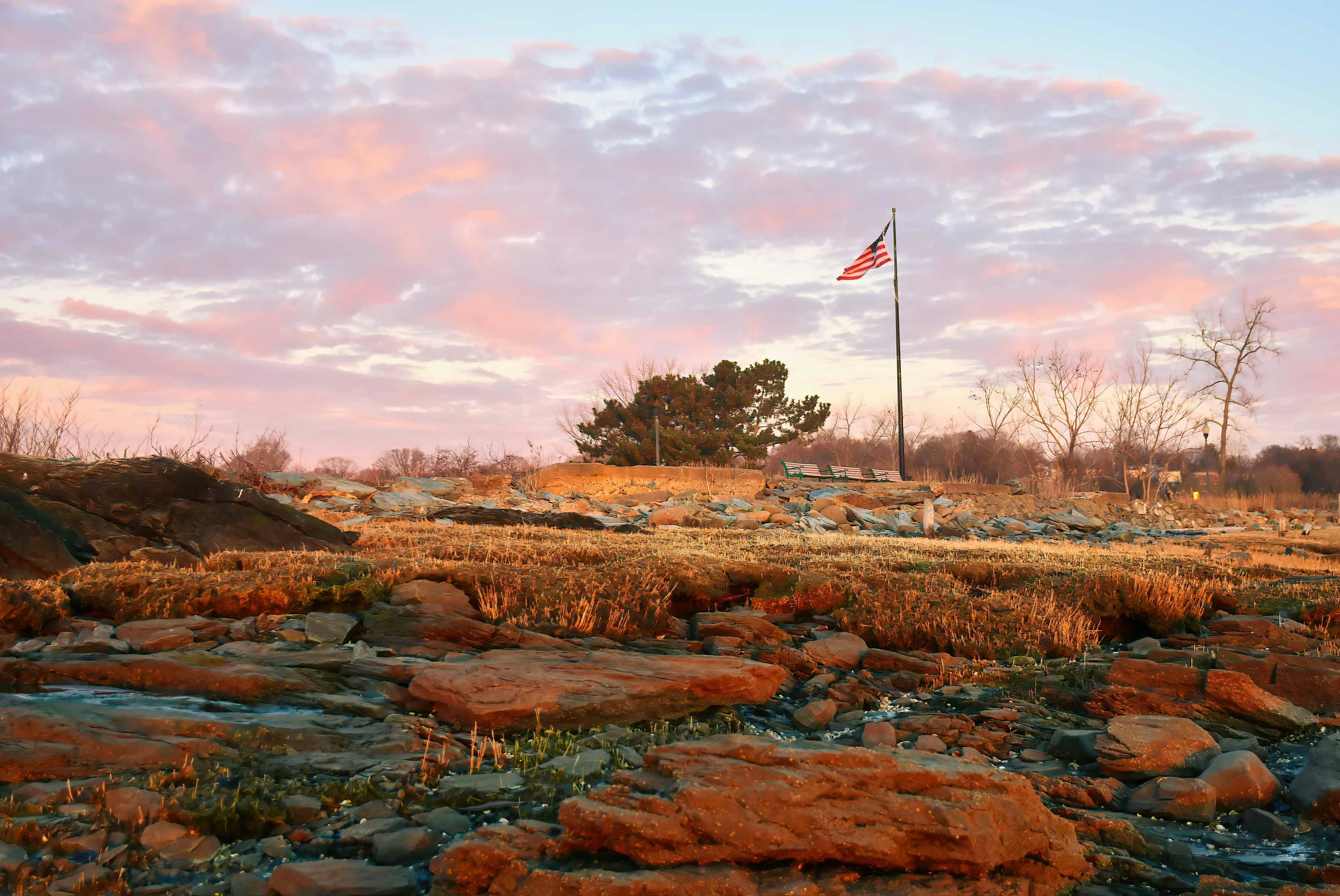 Flagpole at Amber Ridge: a Quiet Shore Under Painted Skies