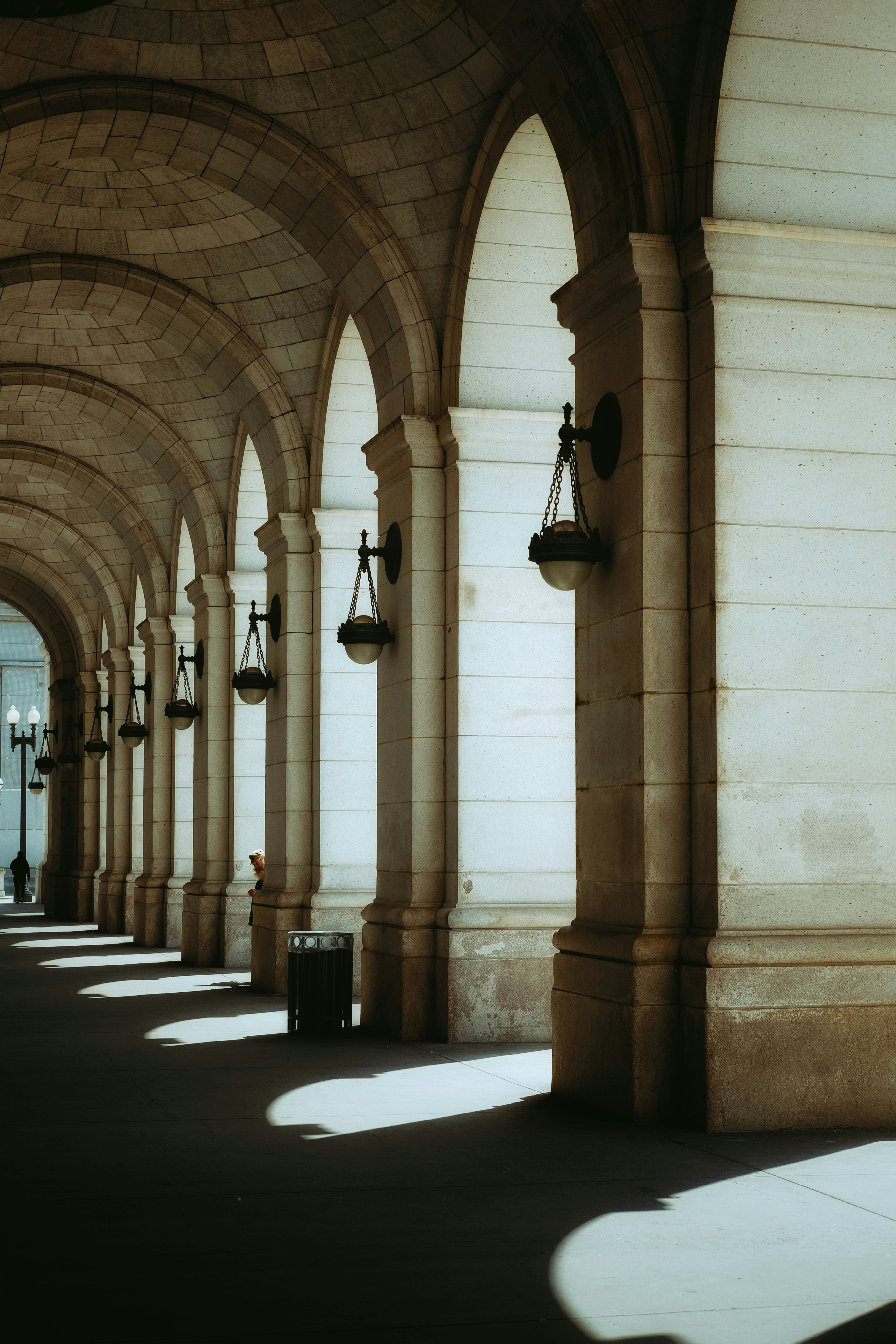 A row of pillars with a clock on each of them photo – Free Union ...