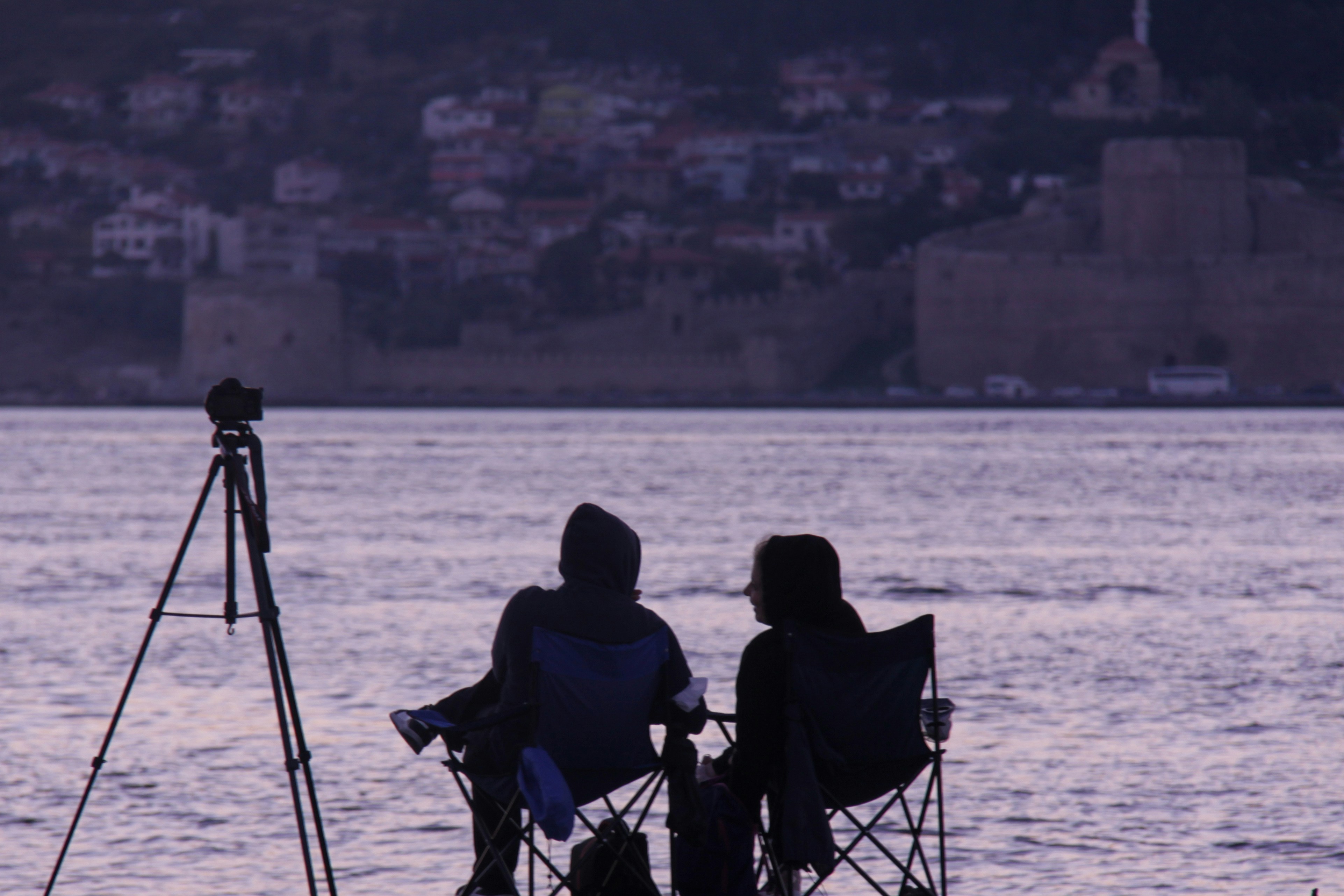 Twilight Conversations by the Waterside
