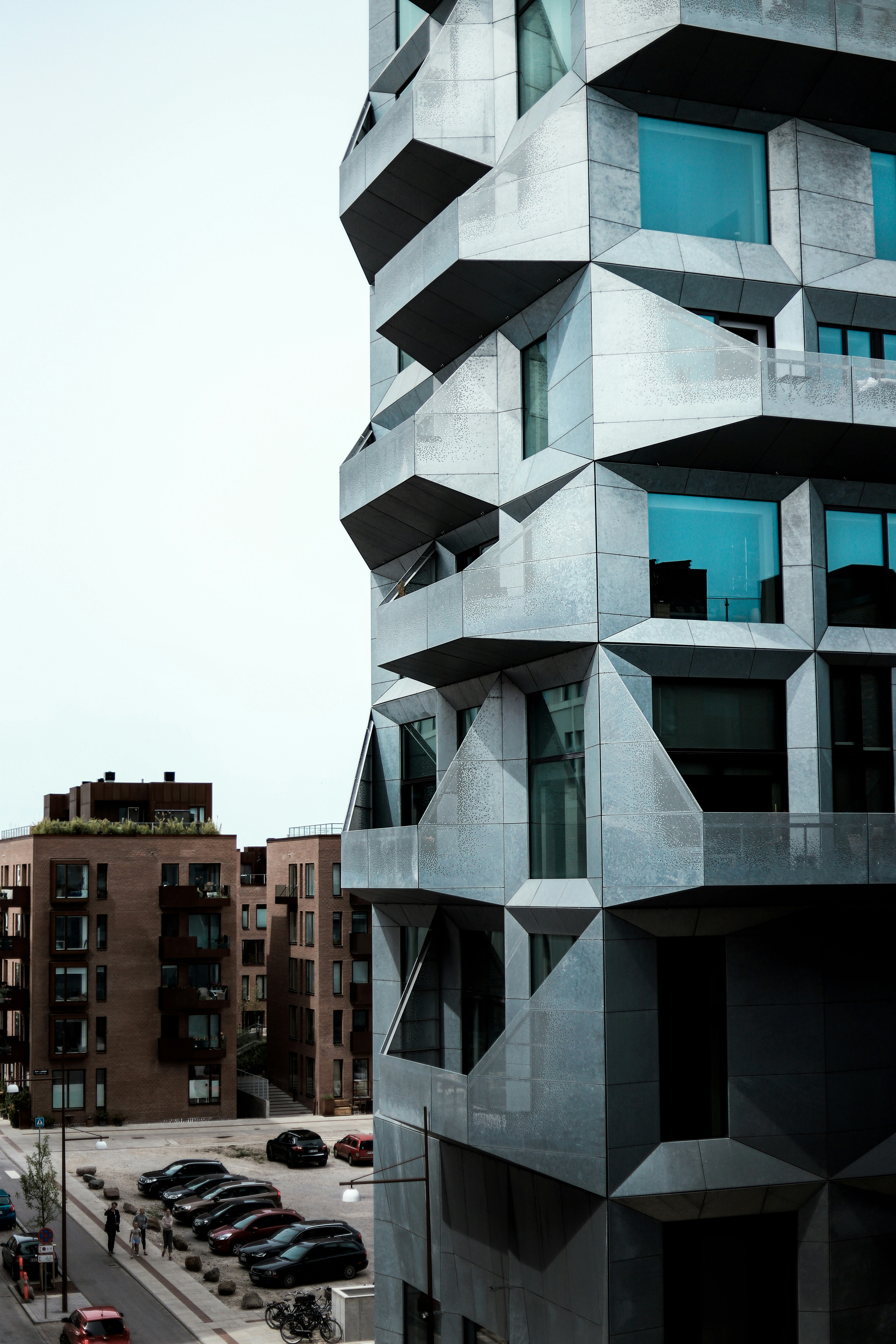 Cubist Prism: The Angular Facade Reaching Toward a Pale Sky