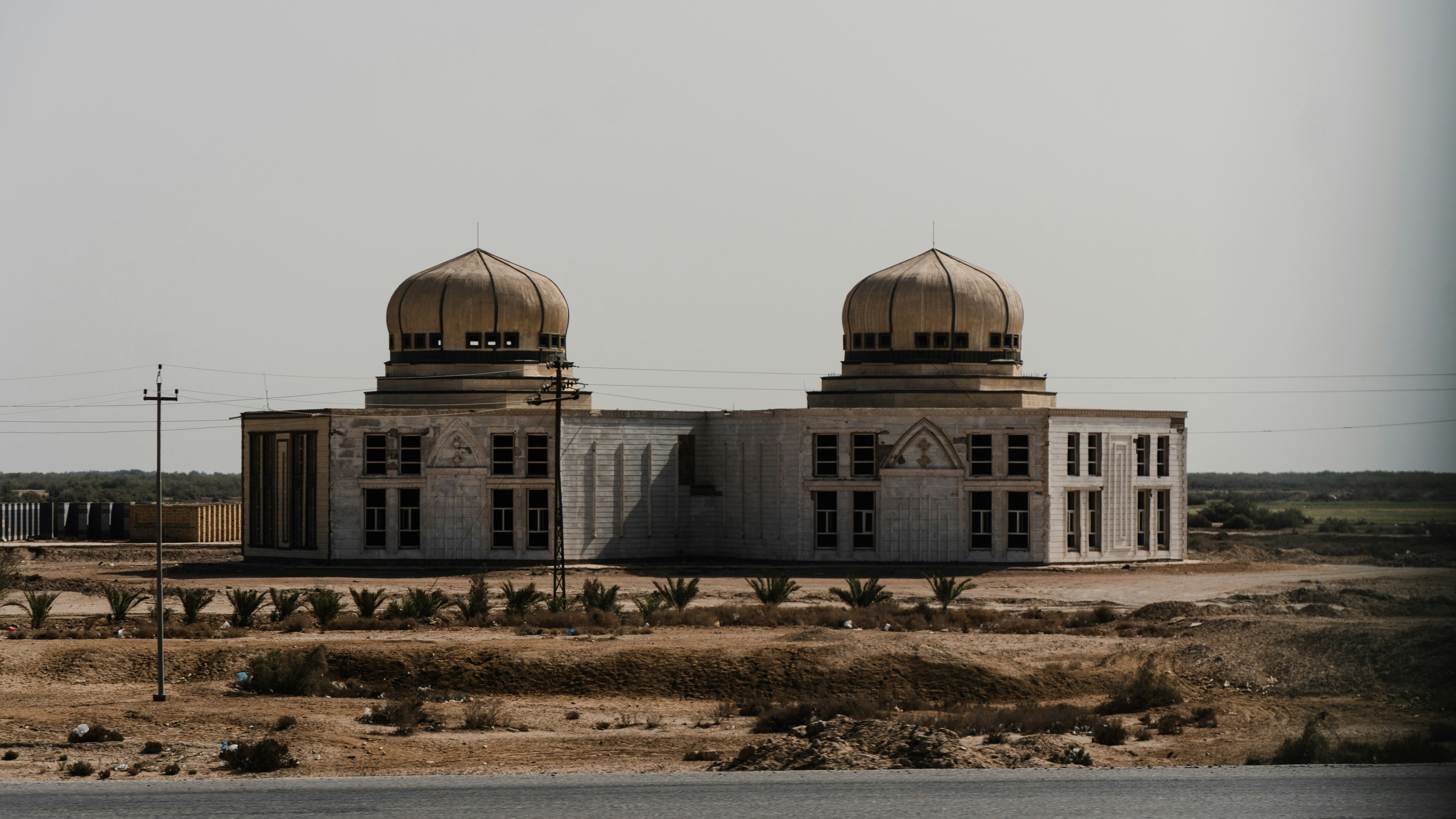 A large building with two domes on top of it photo – Free Grey Image on ...