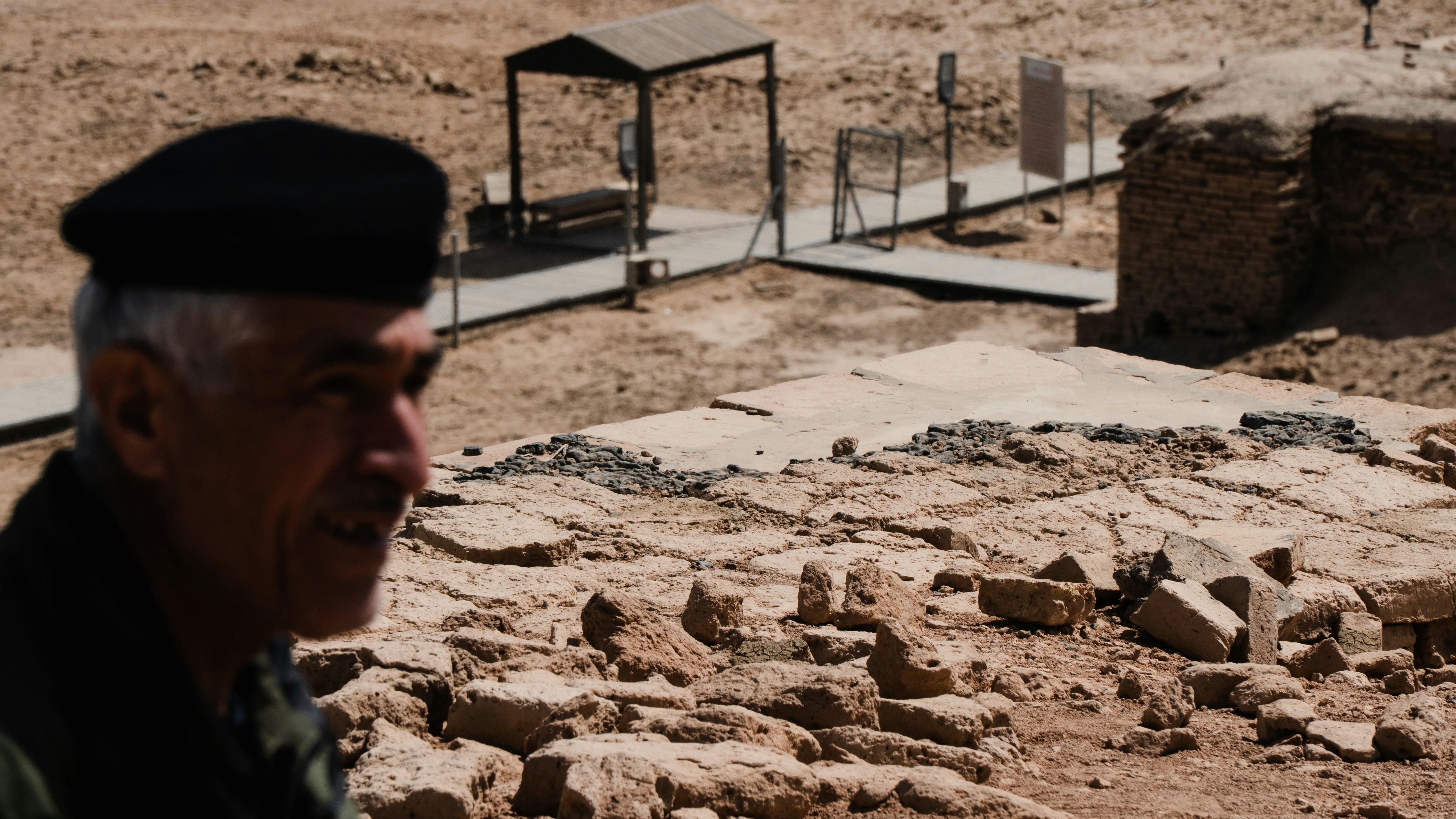Old Guard at a Sun-Baked Archaeological Site