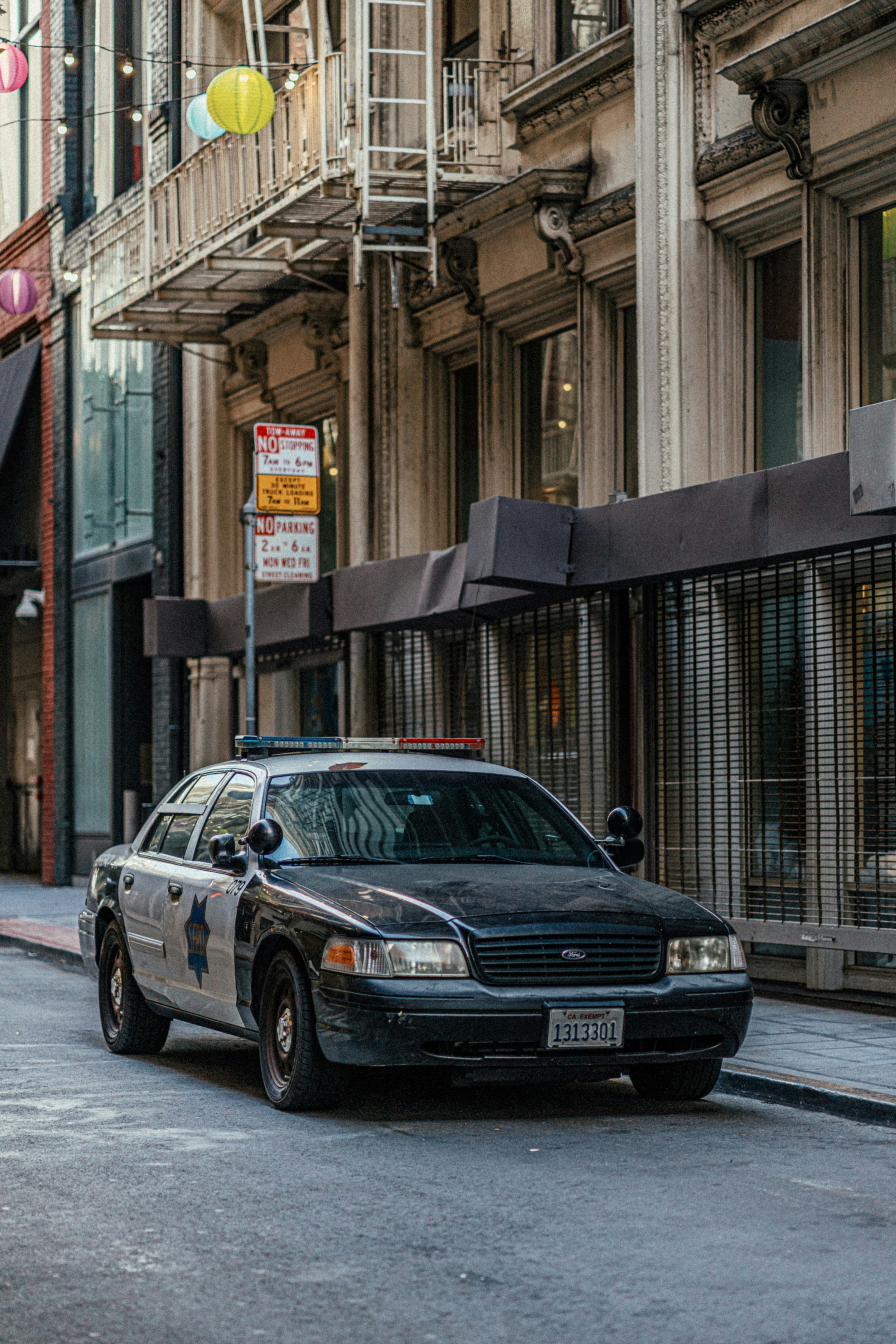 A police car parked on the side of the road photo – Free Car Image on ...
