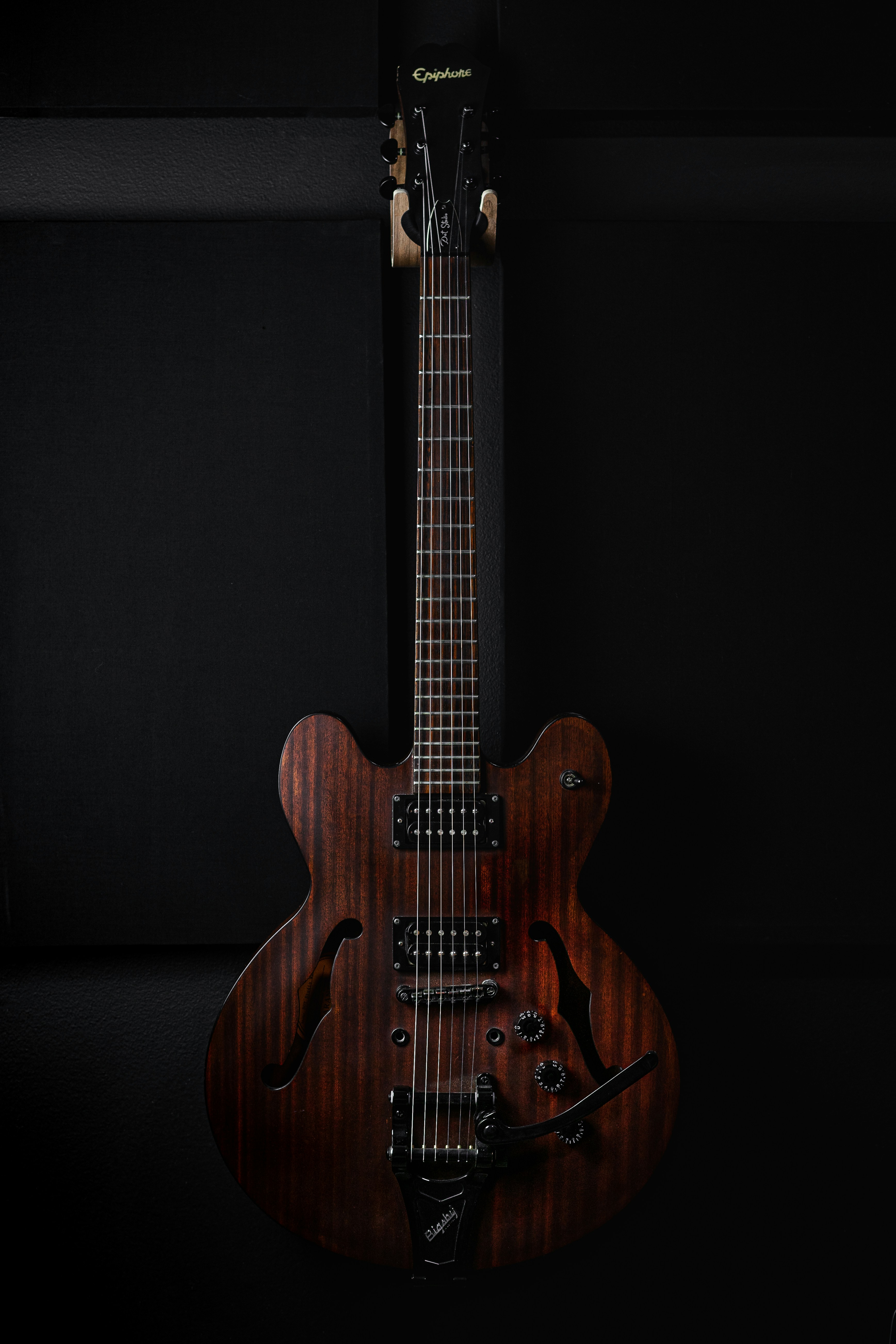 Midnight Walnut Semi-Hollow: Craft and Chrome in Low Light