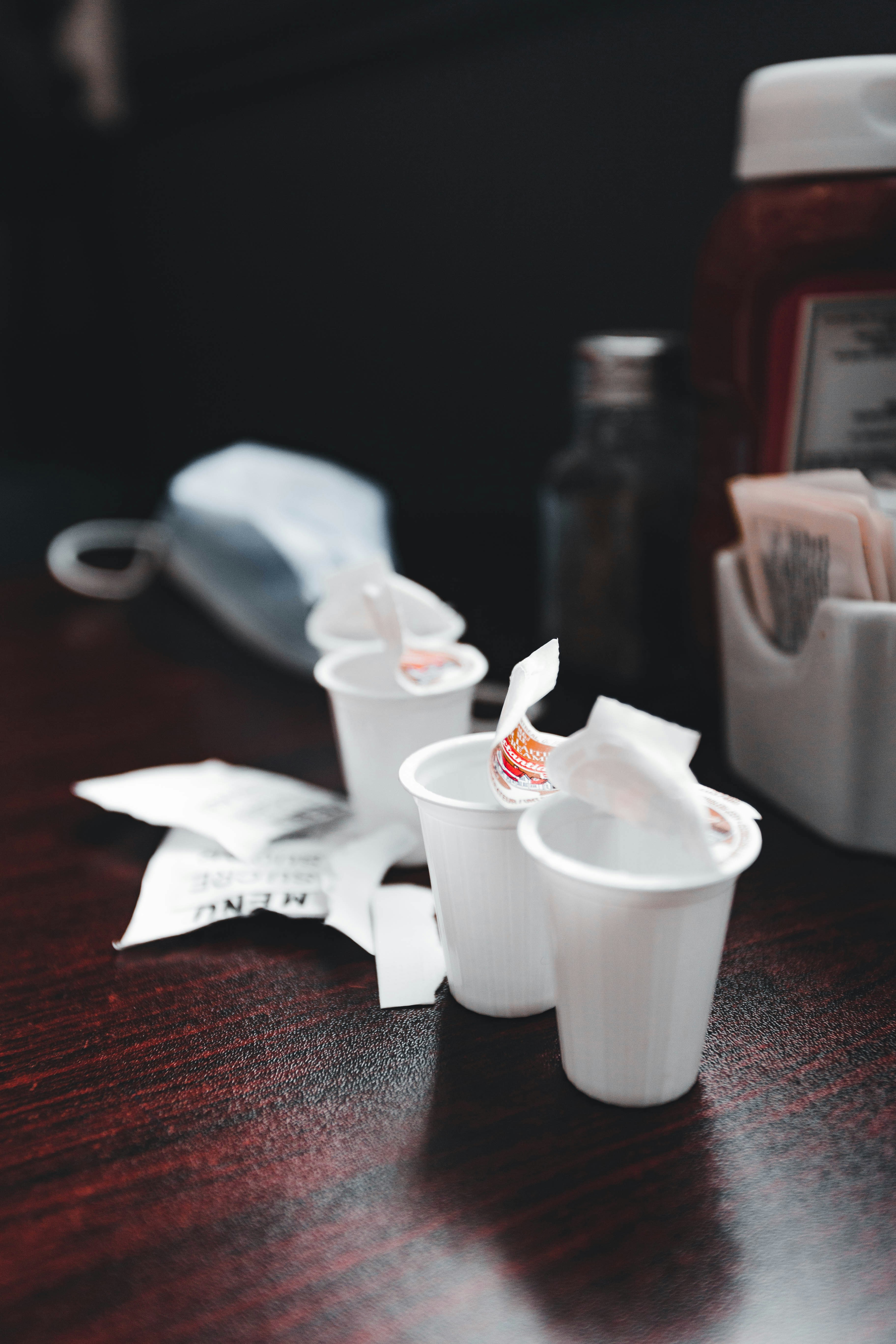 Three White Cups, One Quiet Table: A Diner's Subtle Portrait