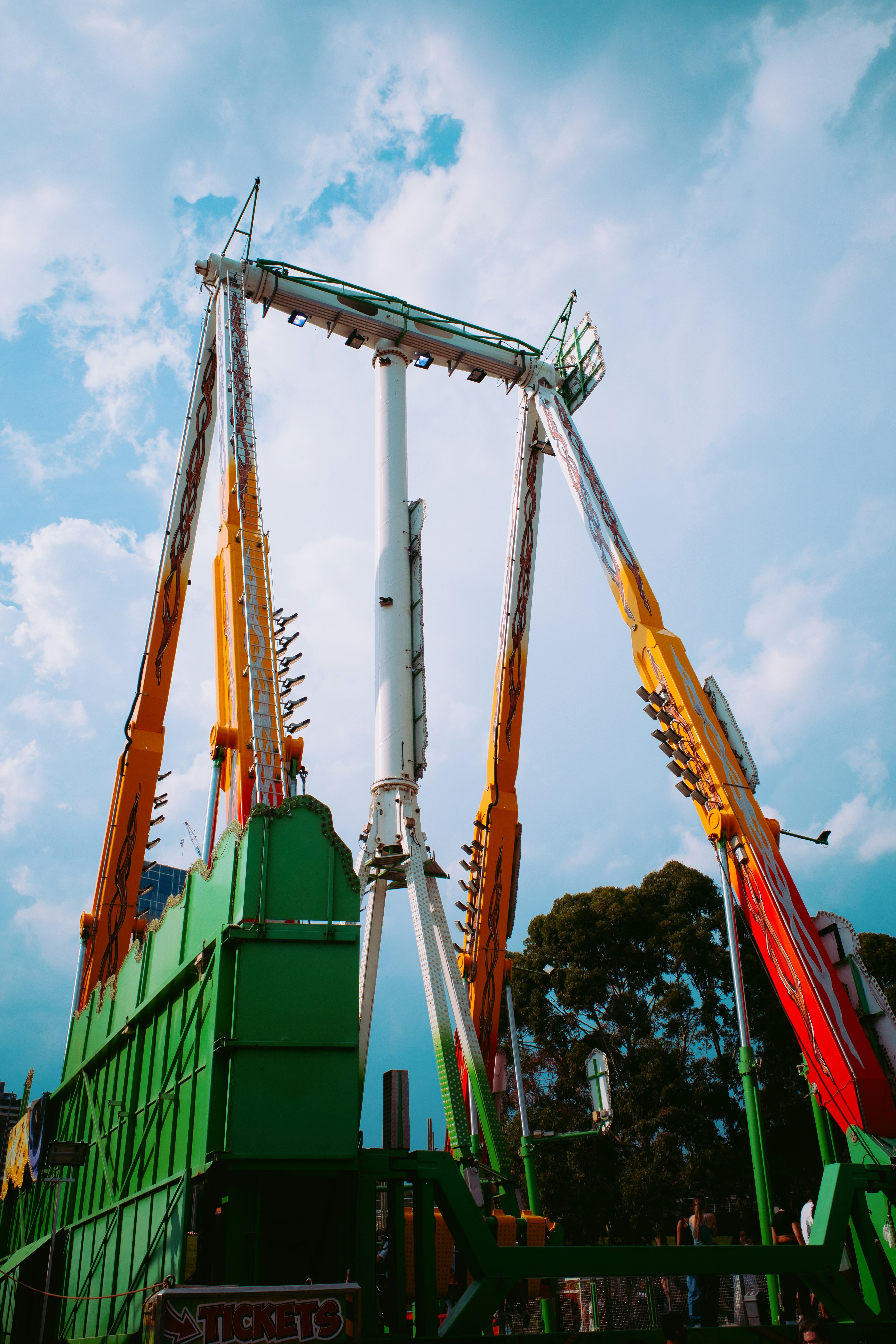 Crane Carousel at Dusk: A Towering Ride Reaches for the Sky