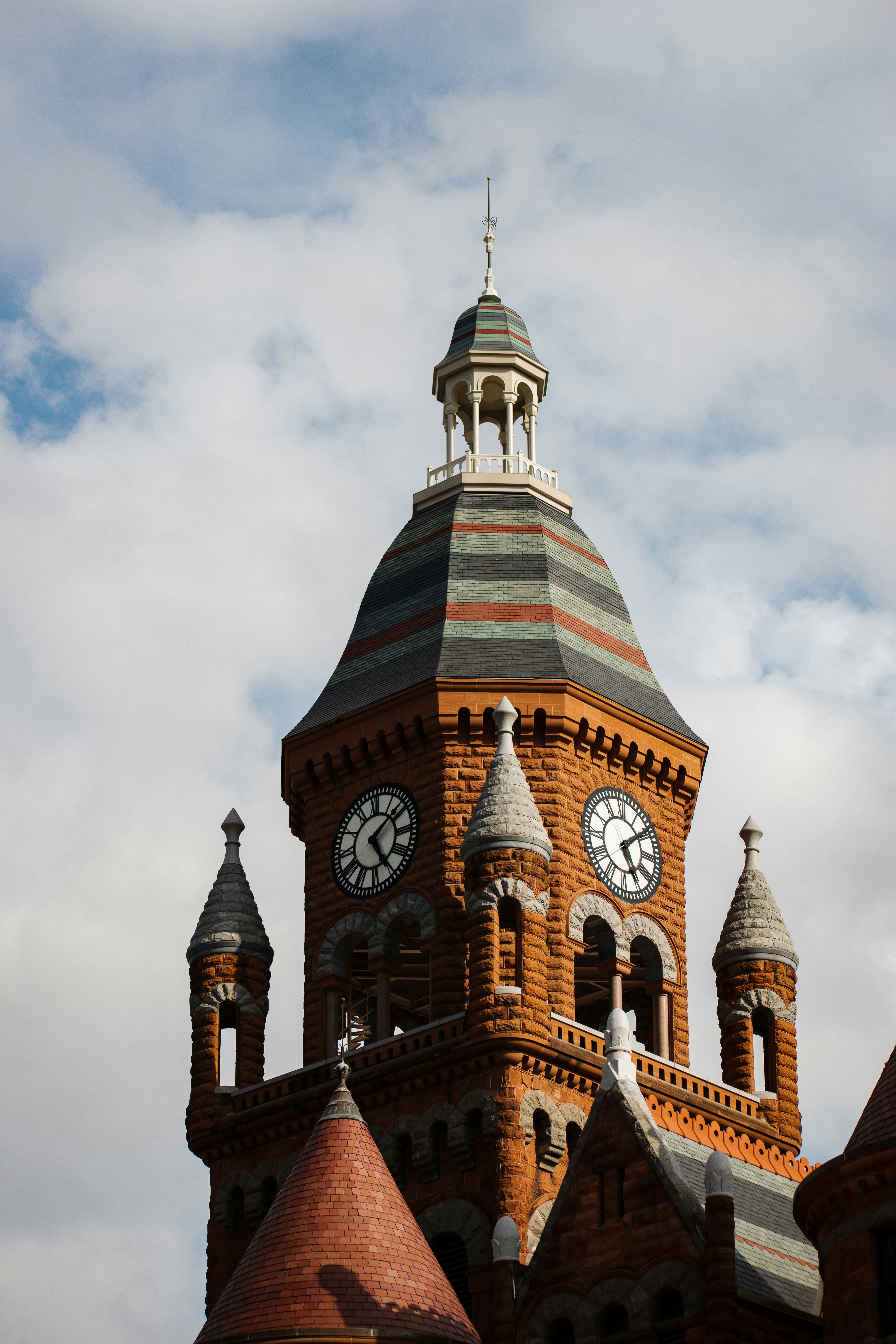 A large building with a clock on the top of it photo – Free Dallas ...