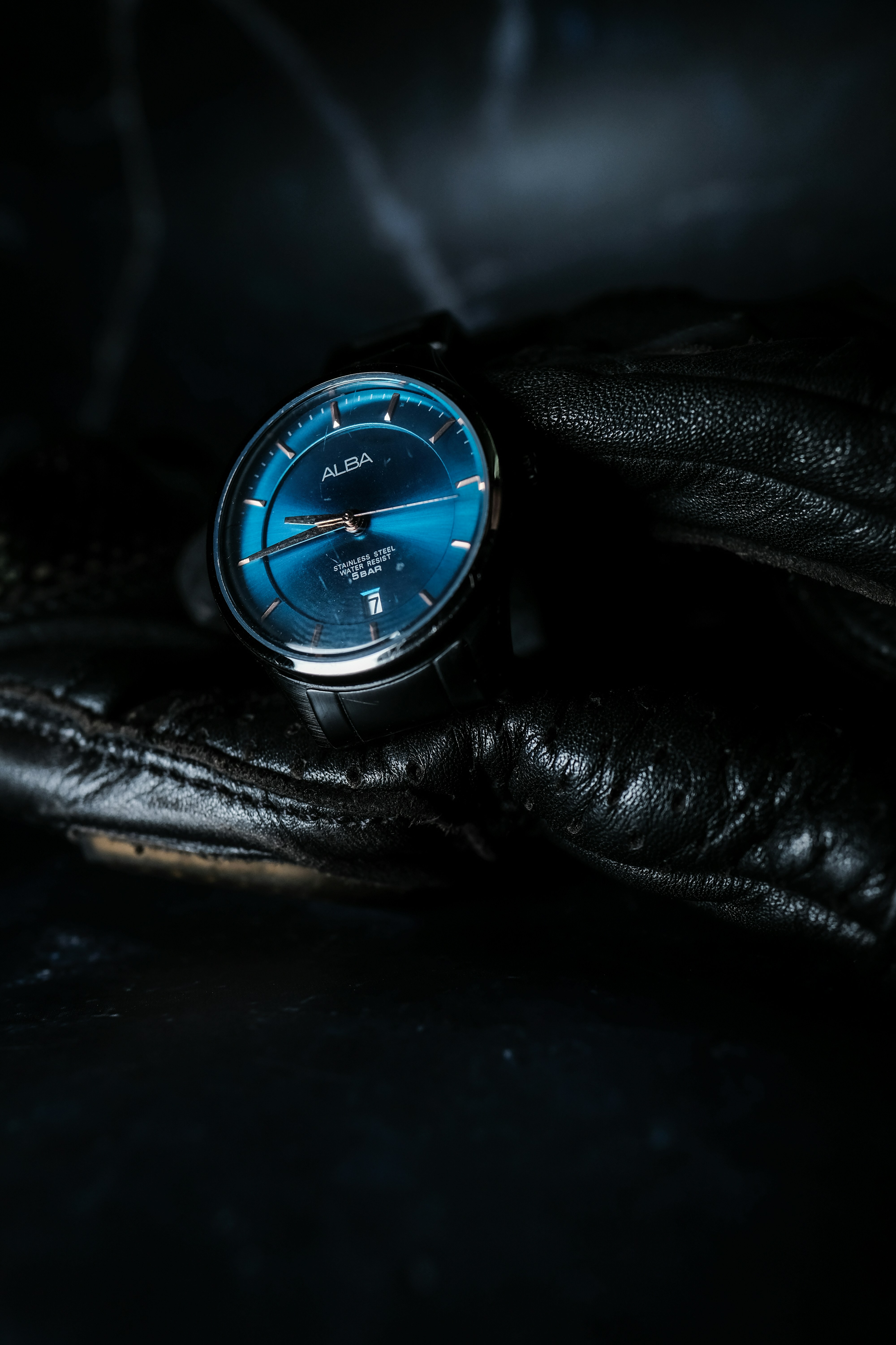 Azure Dial in Velvet Darkness: Alba on Leather
