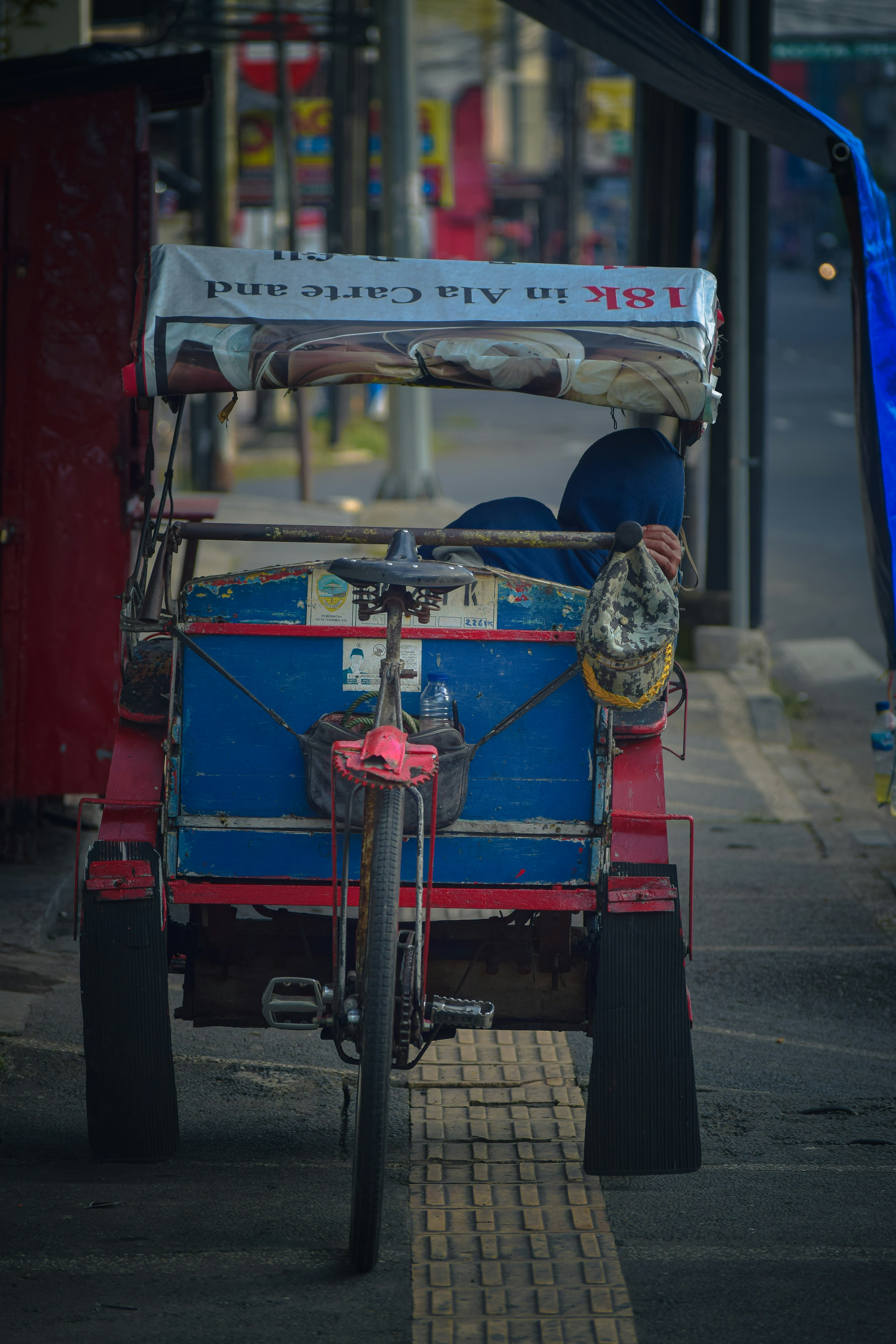 A bicycle is attached to the back of a cart photo – Free Technology ...