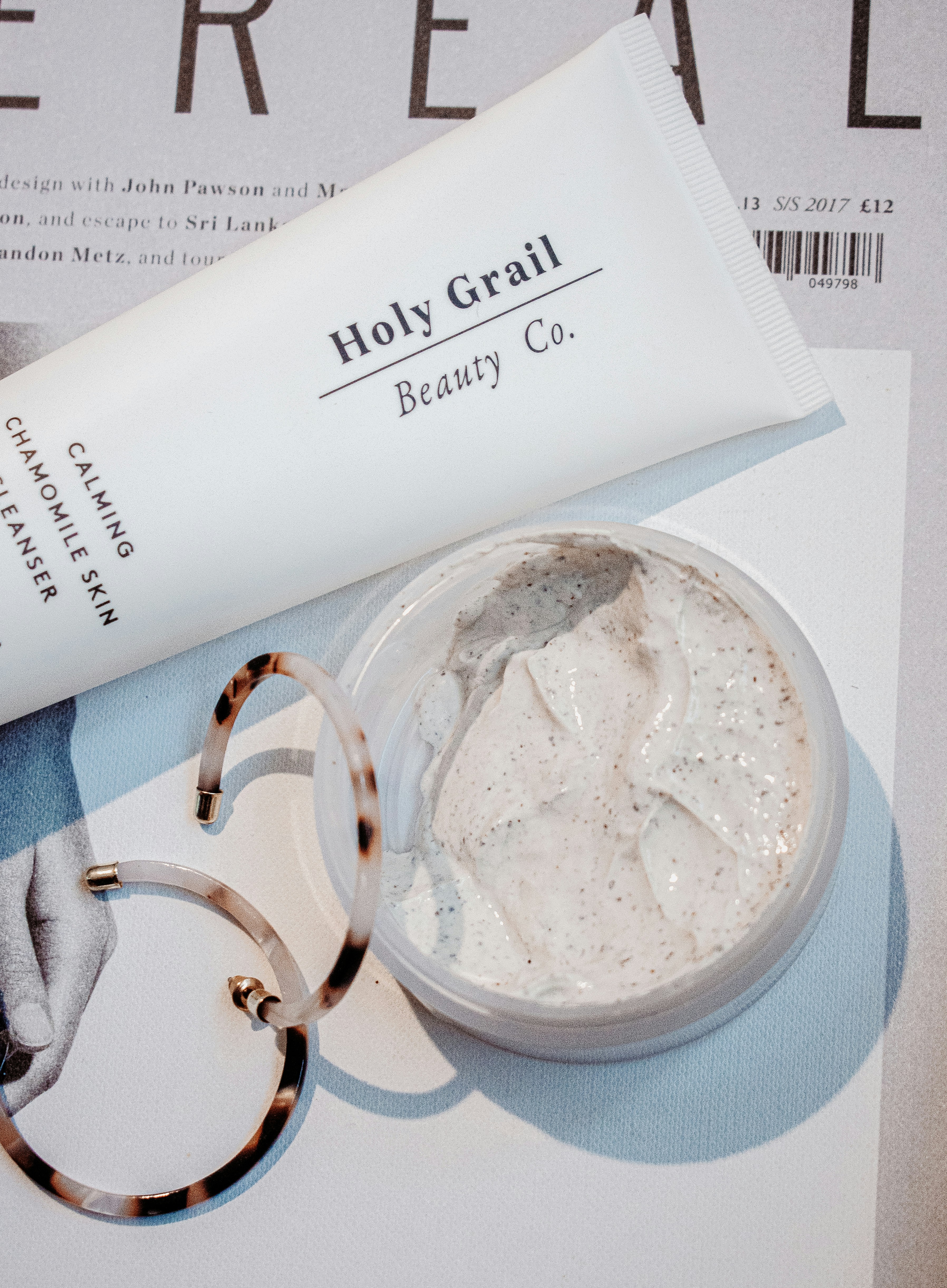 Holy Grail Beauty Co. Tube on a Creamy Stage with Tortoiseshell Ring — An Editorial Still Life