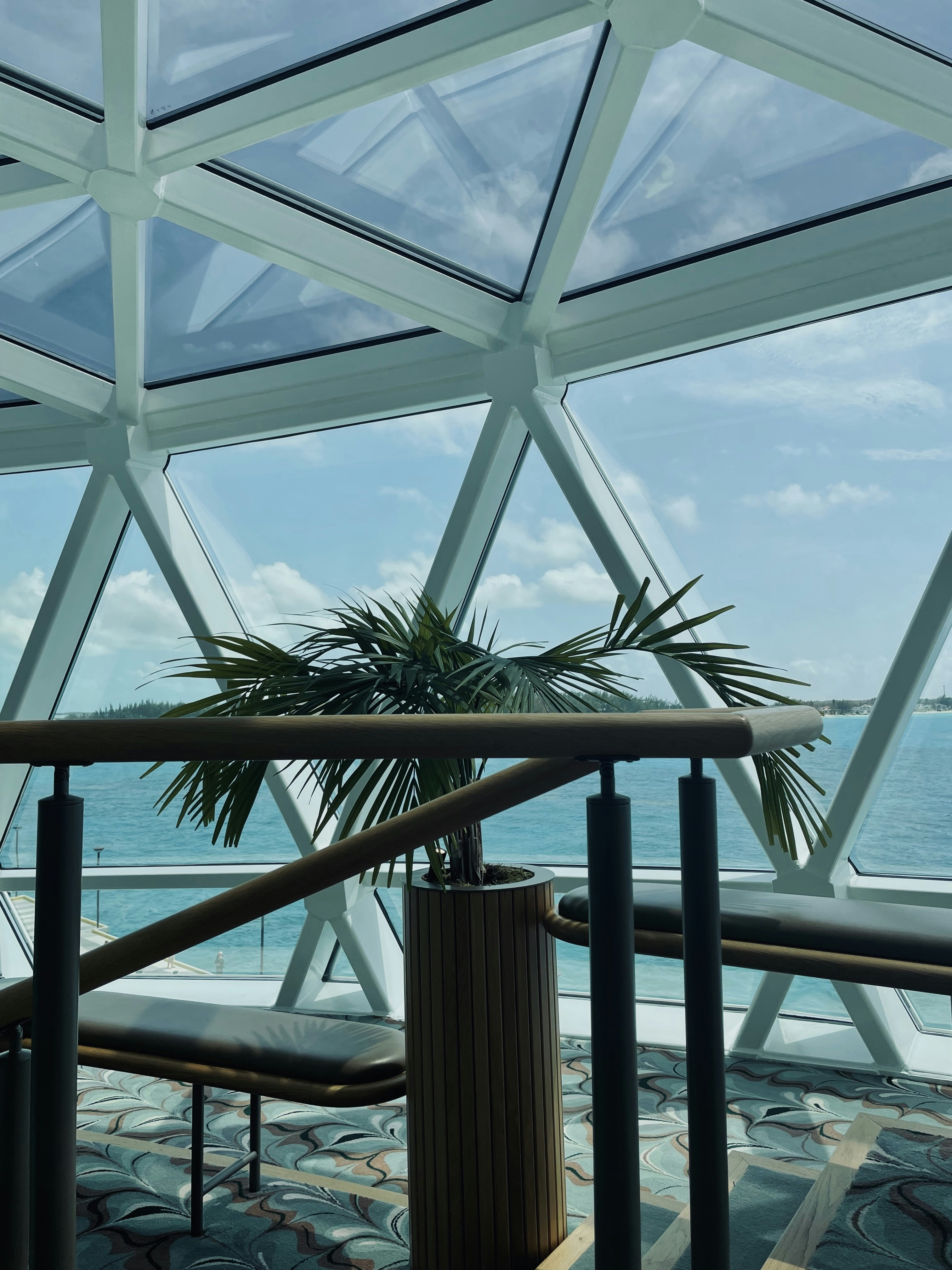 A view of the ocean from inside a building photo – Free Blue Image on ...