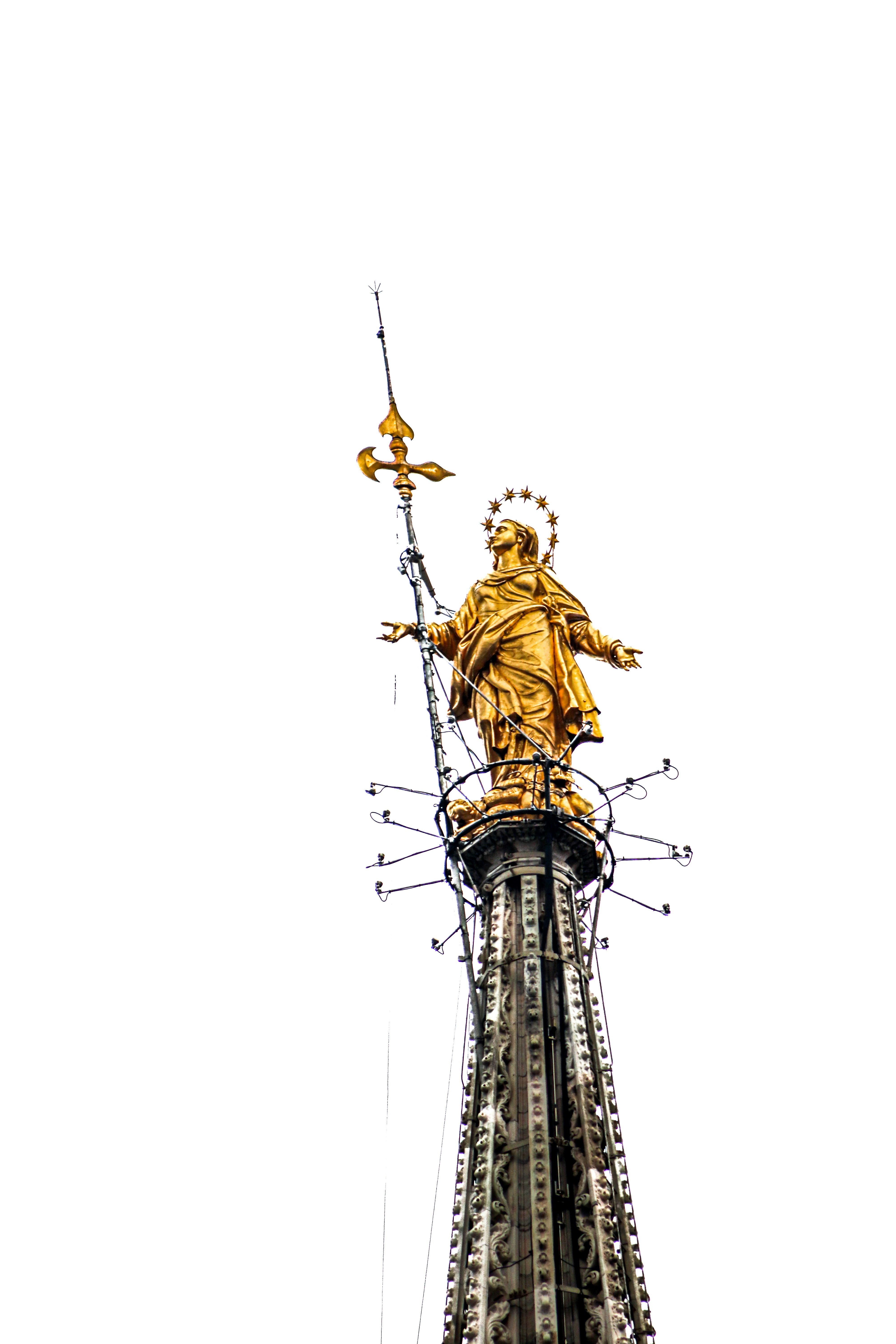 Gilded Saint atop a Skyward Spire