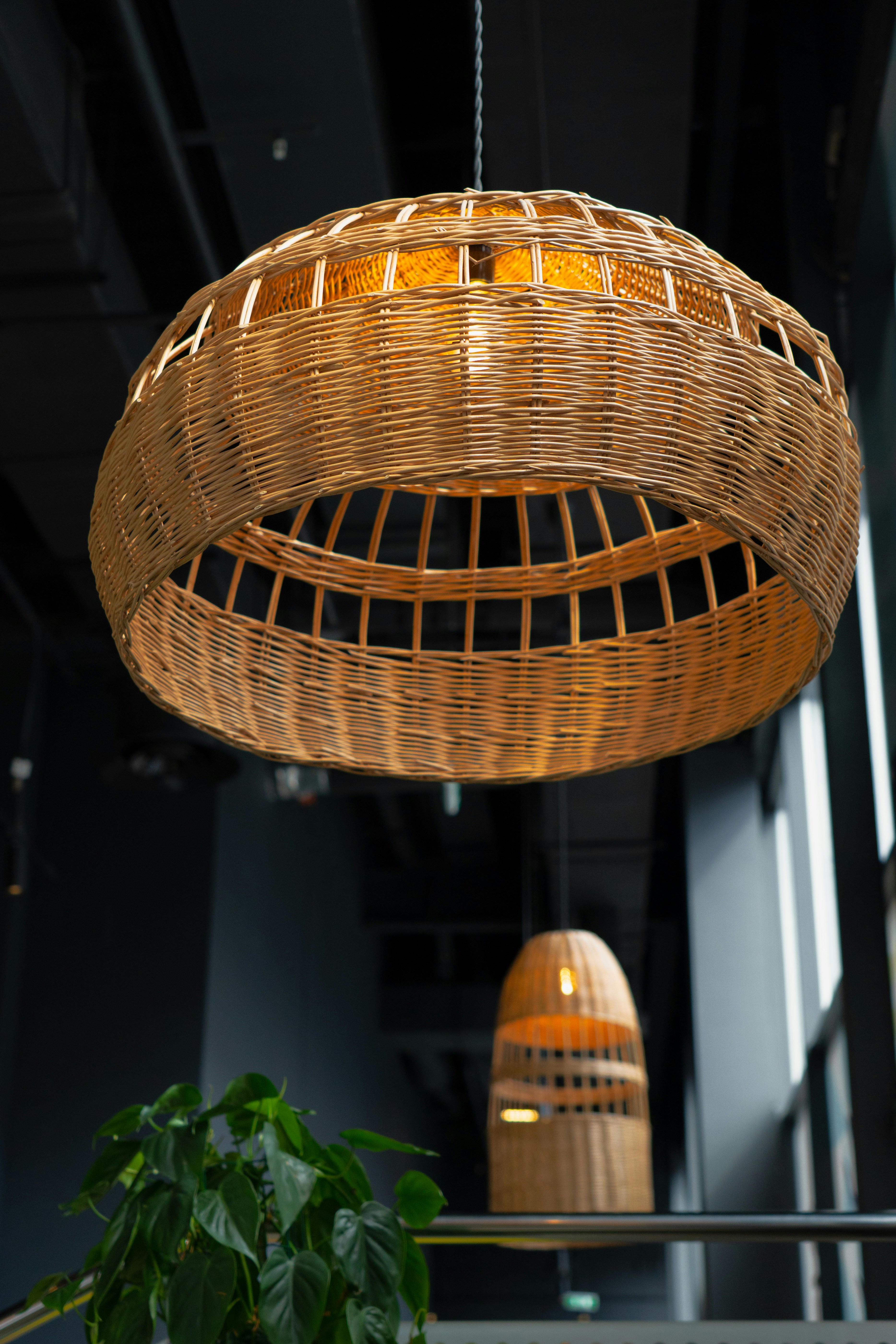 Hanging Basket: A Looming Wicker Lantern in a Modern Interior