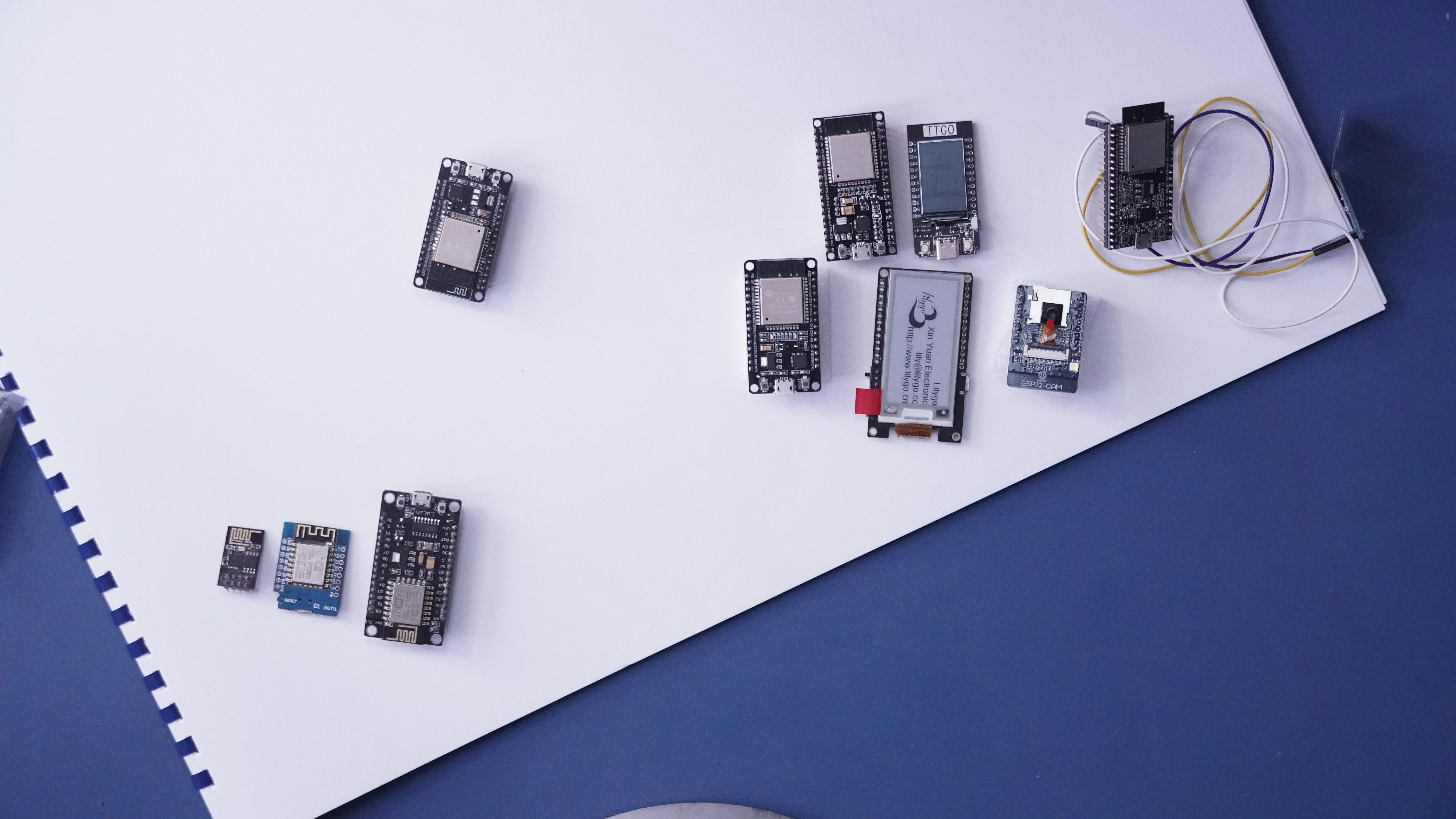 A bunch of electronic components sitting on top of a table photo – Free ...