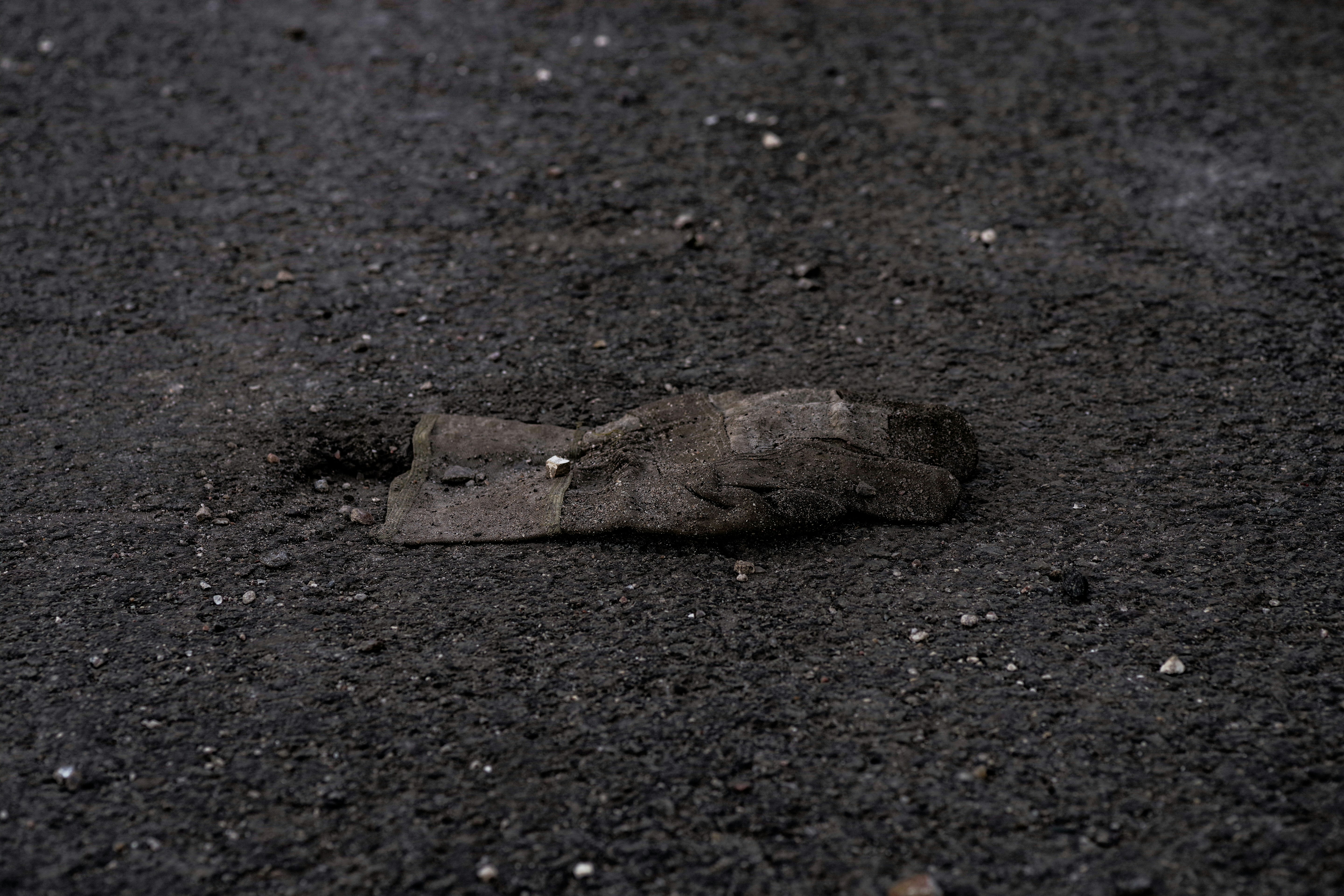 A piece of rock laying on the ground photo – Free Metal Image on Unsplash