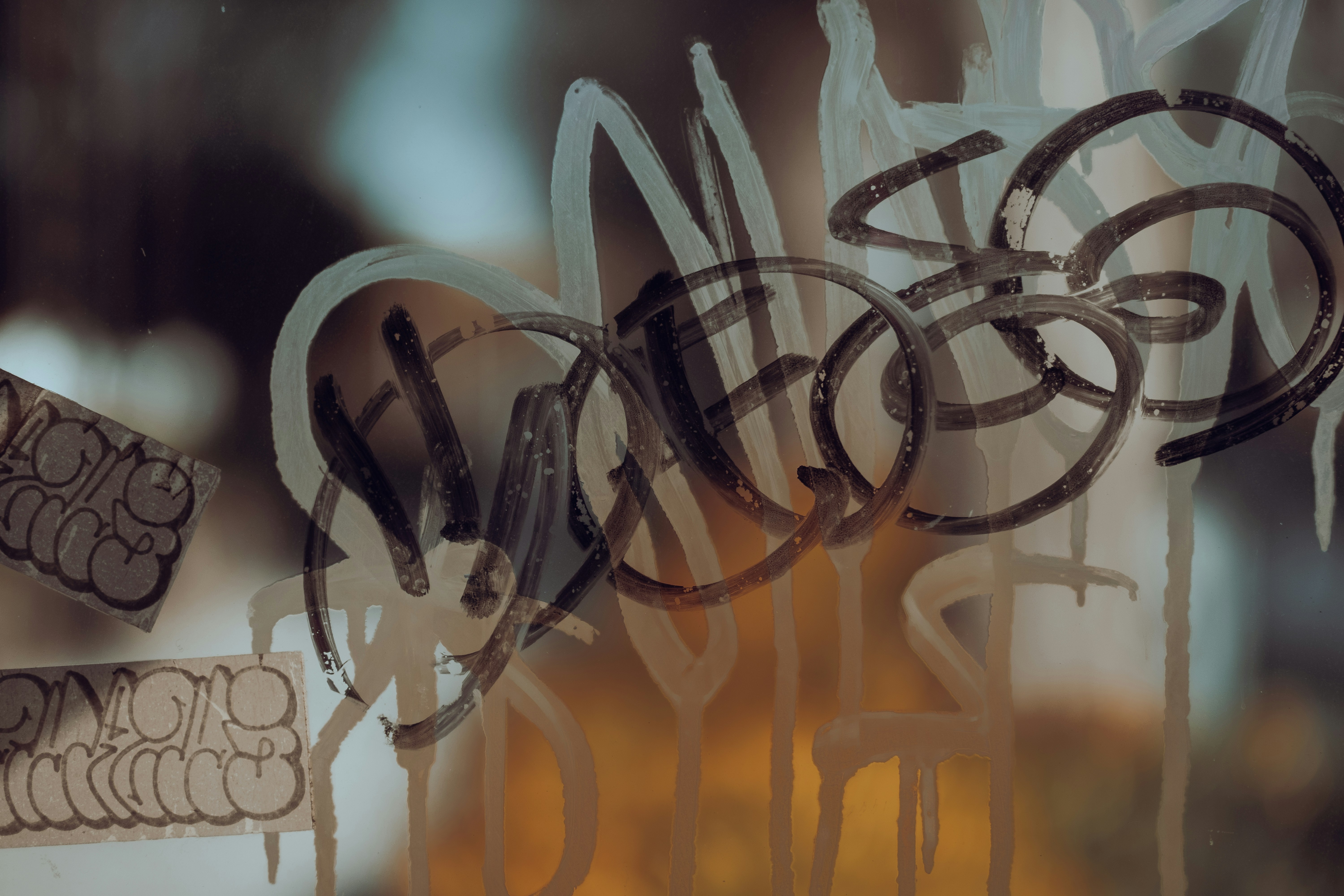 A close up of a frosted glass window with writing on it photo – Free ...