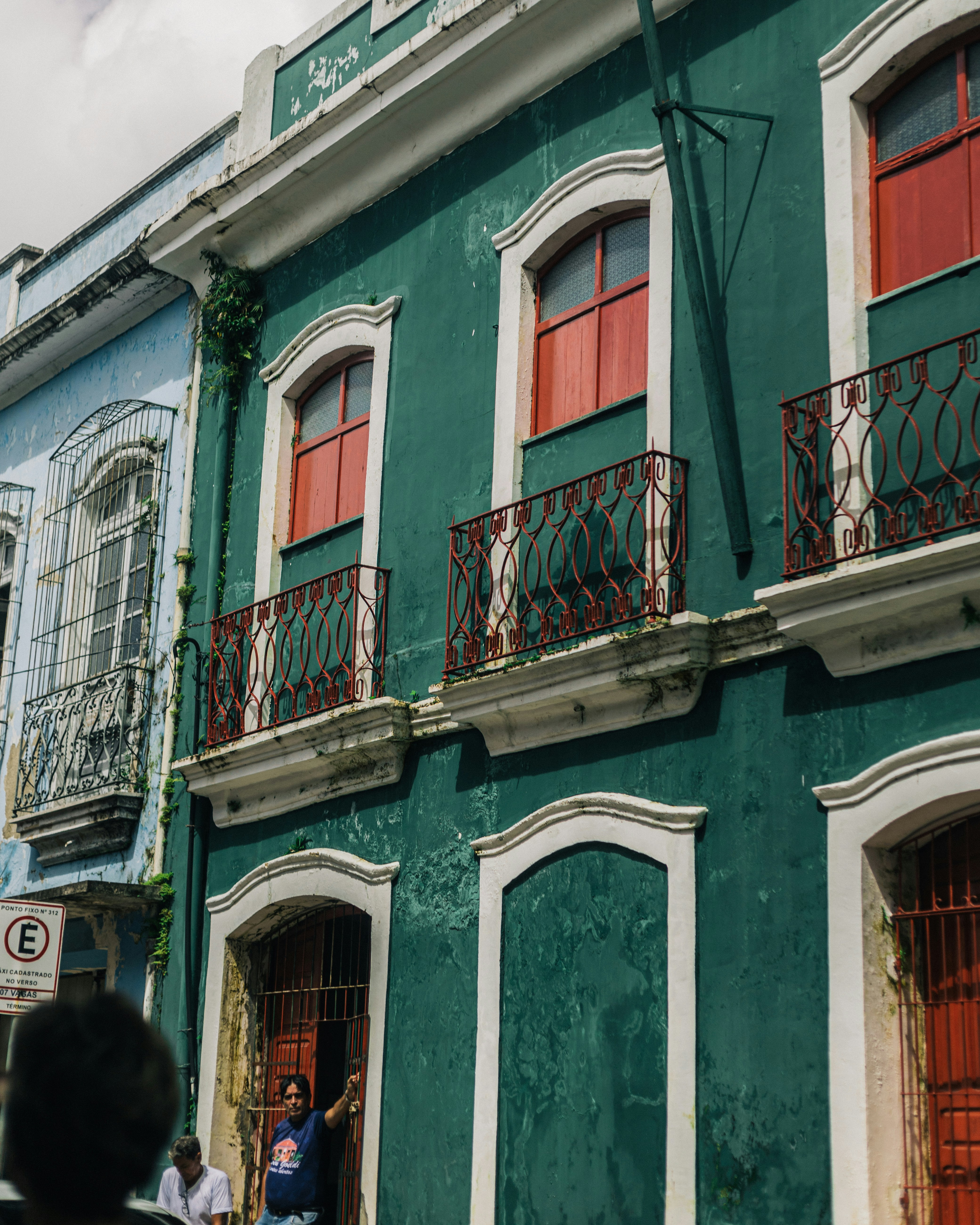 A group of people standing outside of a building photo – Free Brazil ...