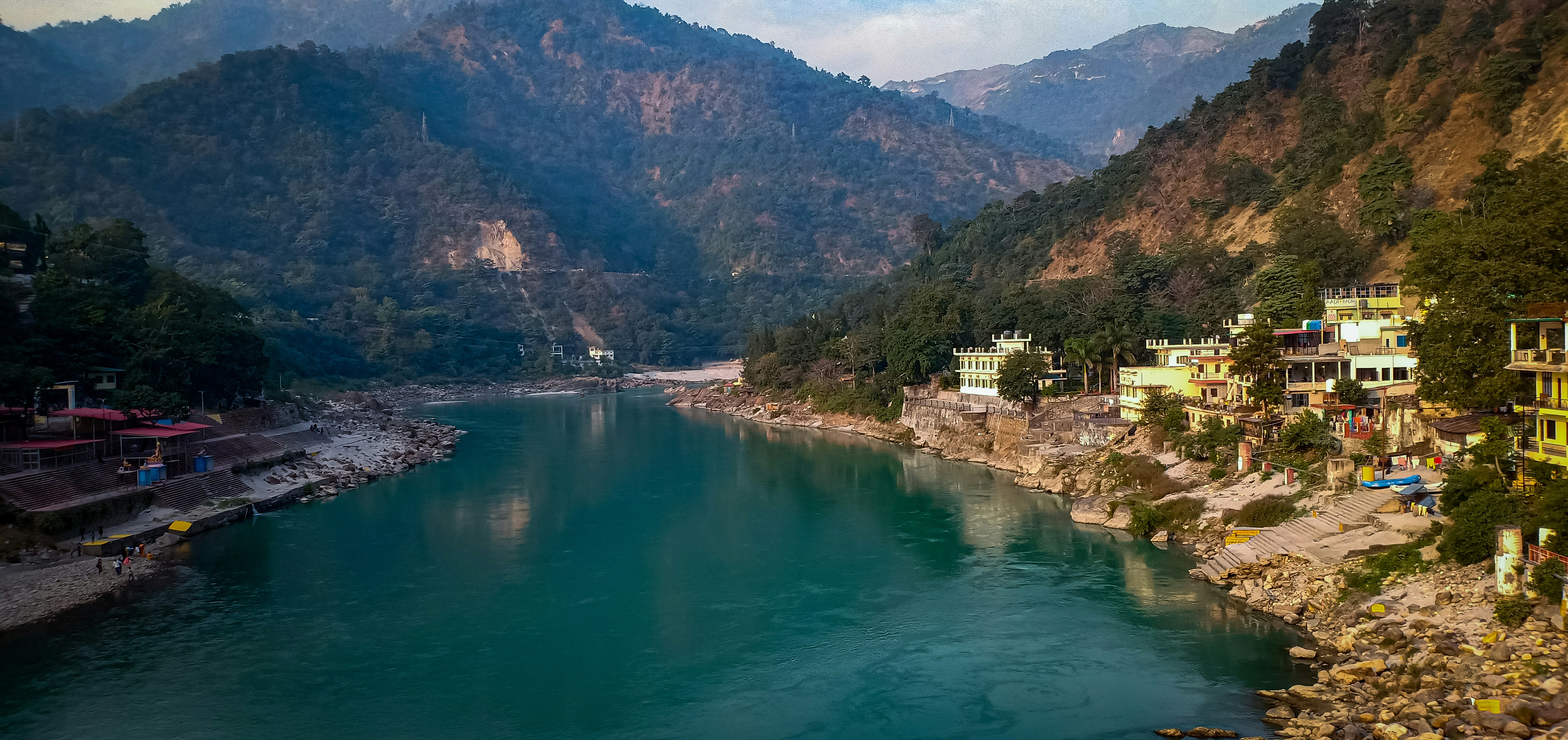 Riverside Village Cloaked in Mountain Veil
