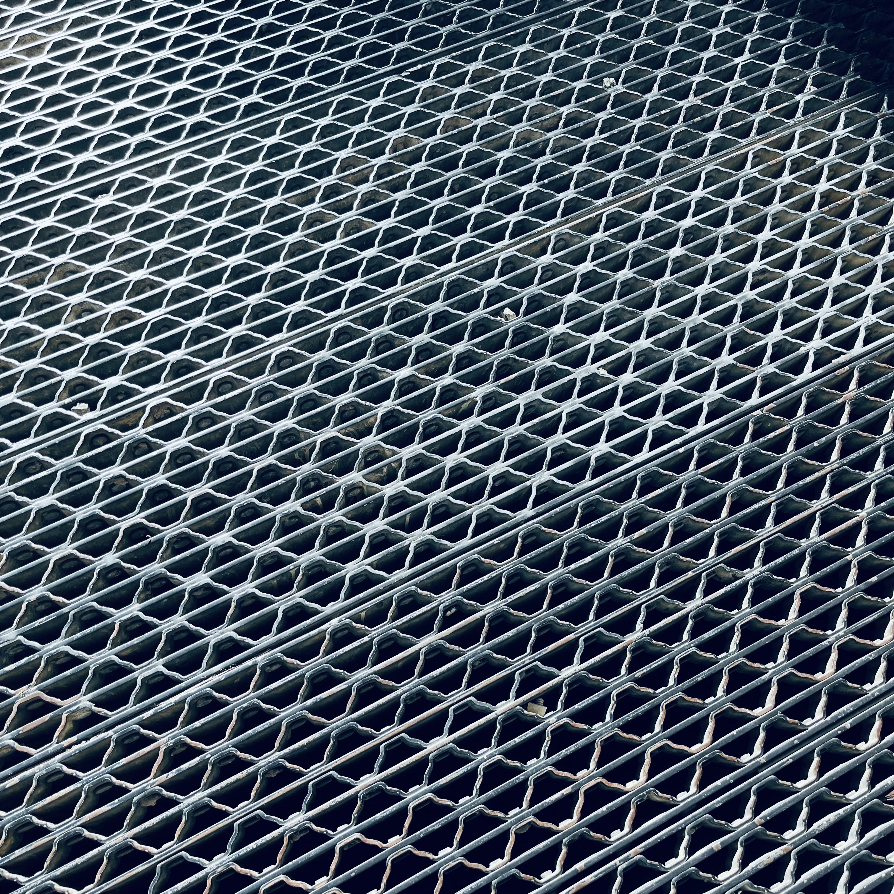 A close up view of a metal grate photo – Free Subway Image on Unsplash