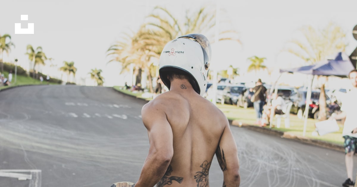 A Man With No Shirt Holding A Skateboard Photo Free Brazil Image On