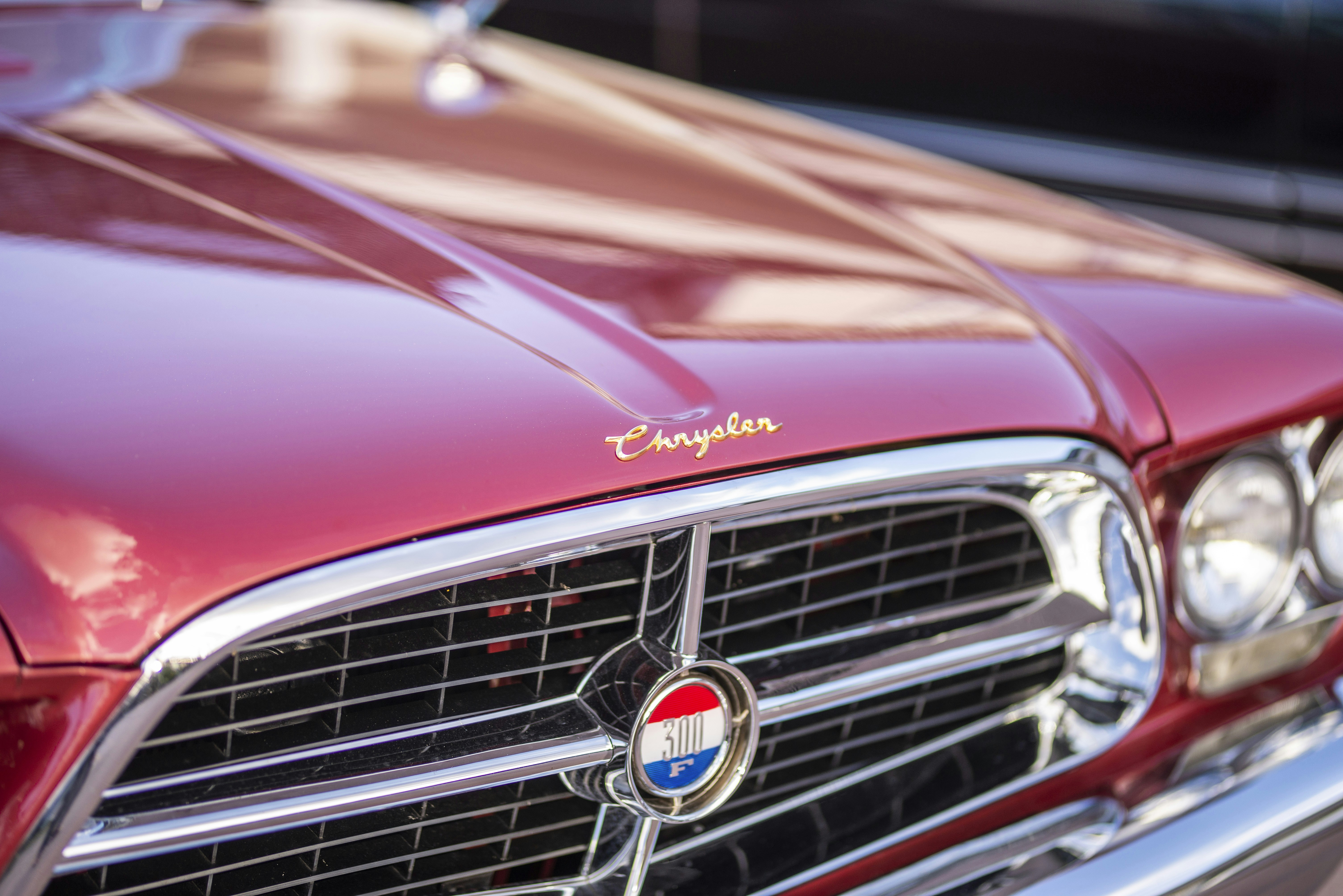 A close up of the front of a red car photo – Free Automobile Image on ...