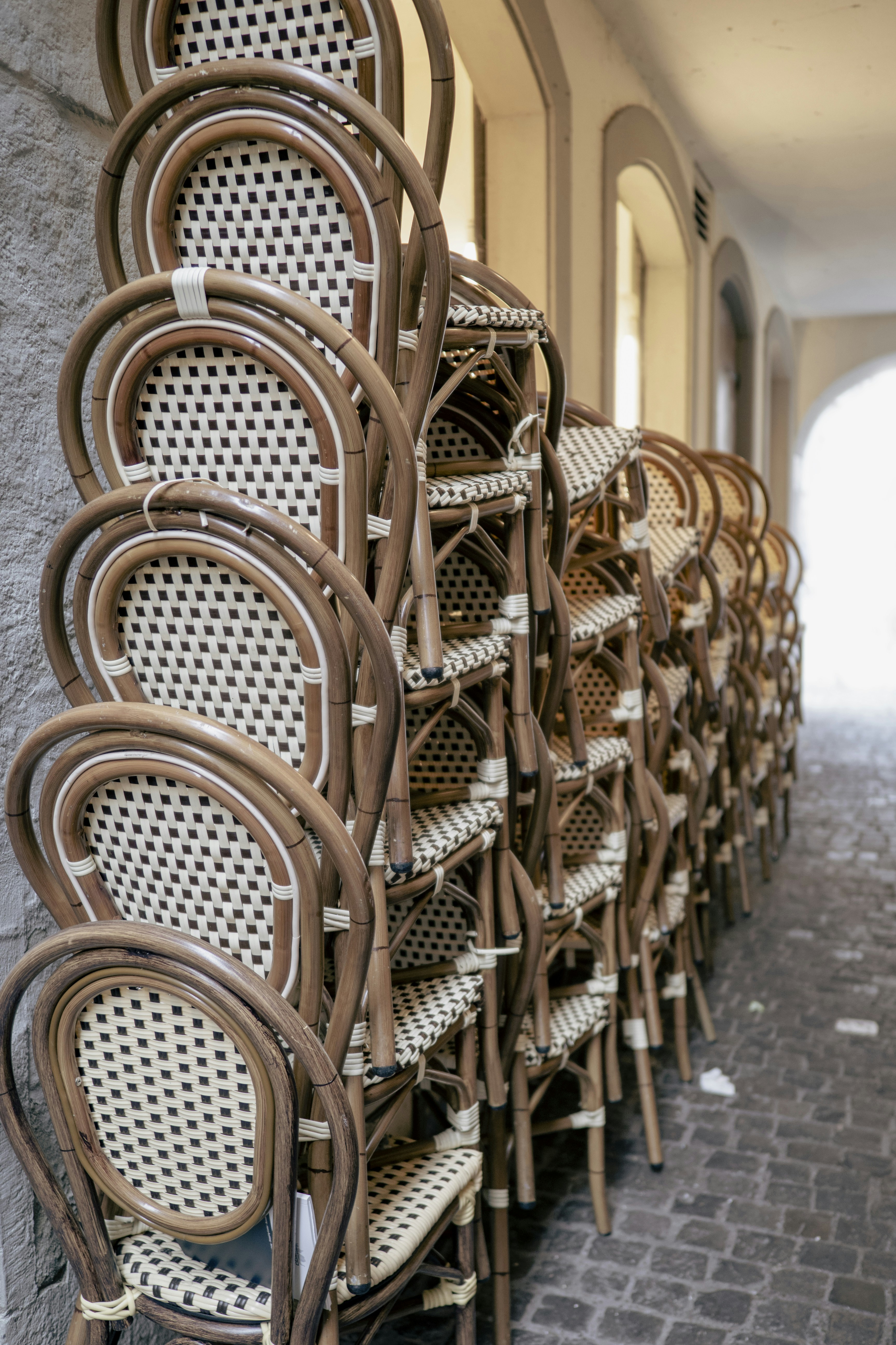 A bunch of chairs are lined up against a wall photo – Free Lucerne ...