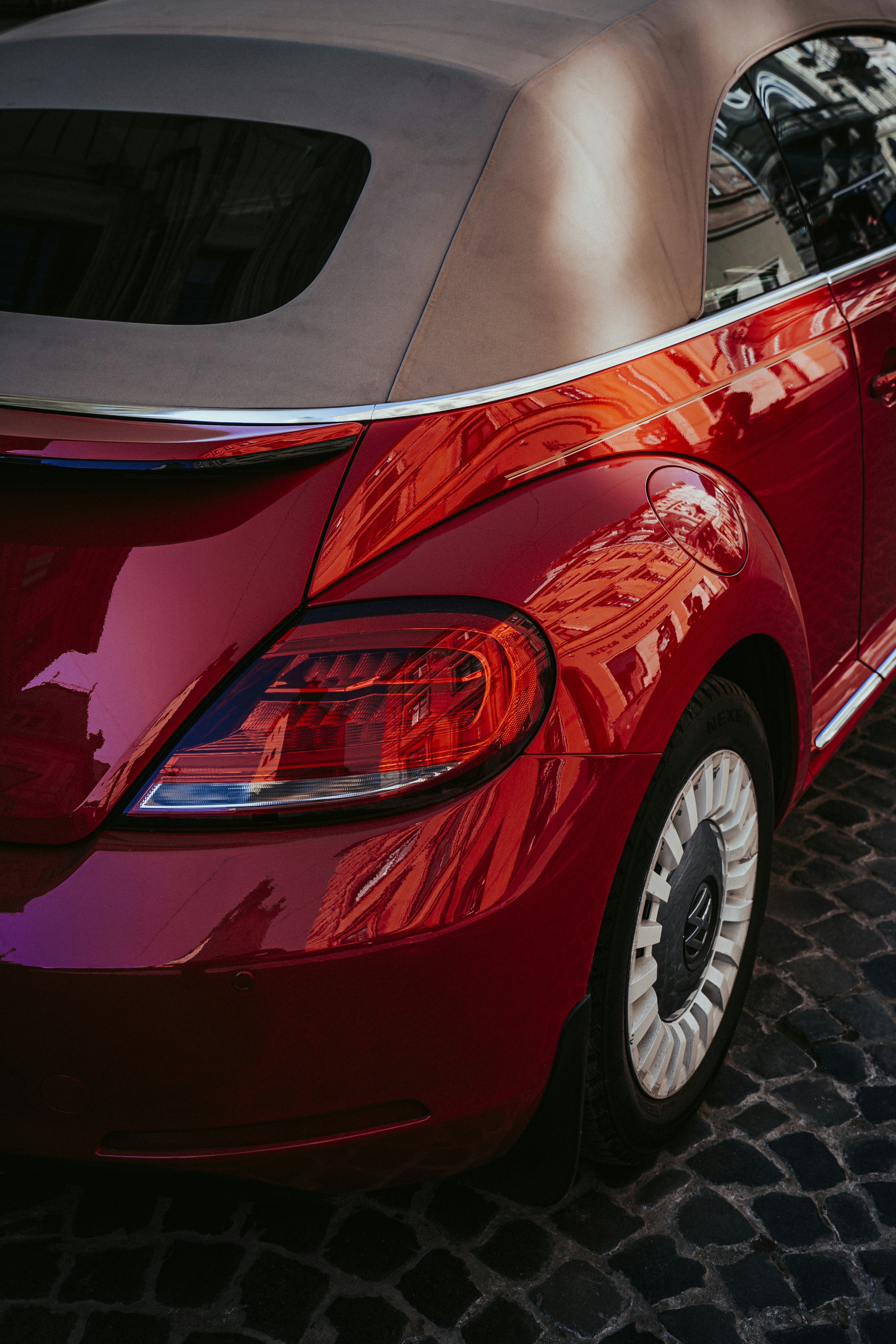 Crimson Cabriolet by Cobblestones: Velvet Top and Reflections