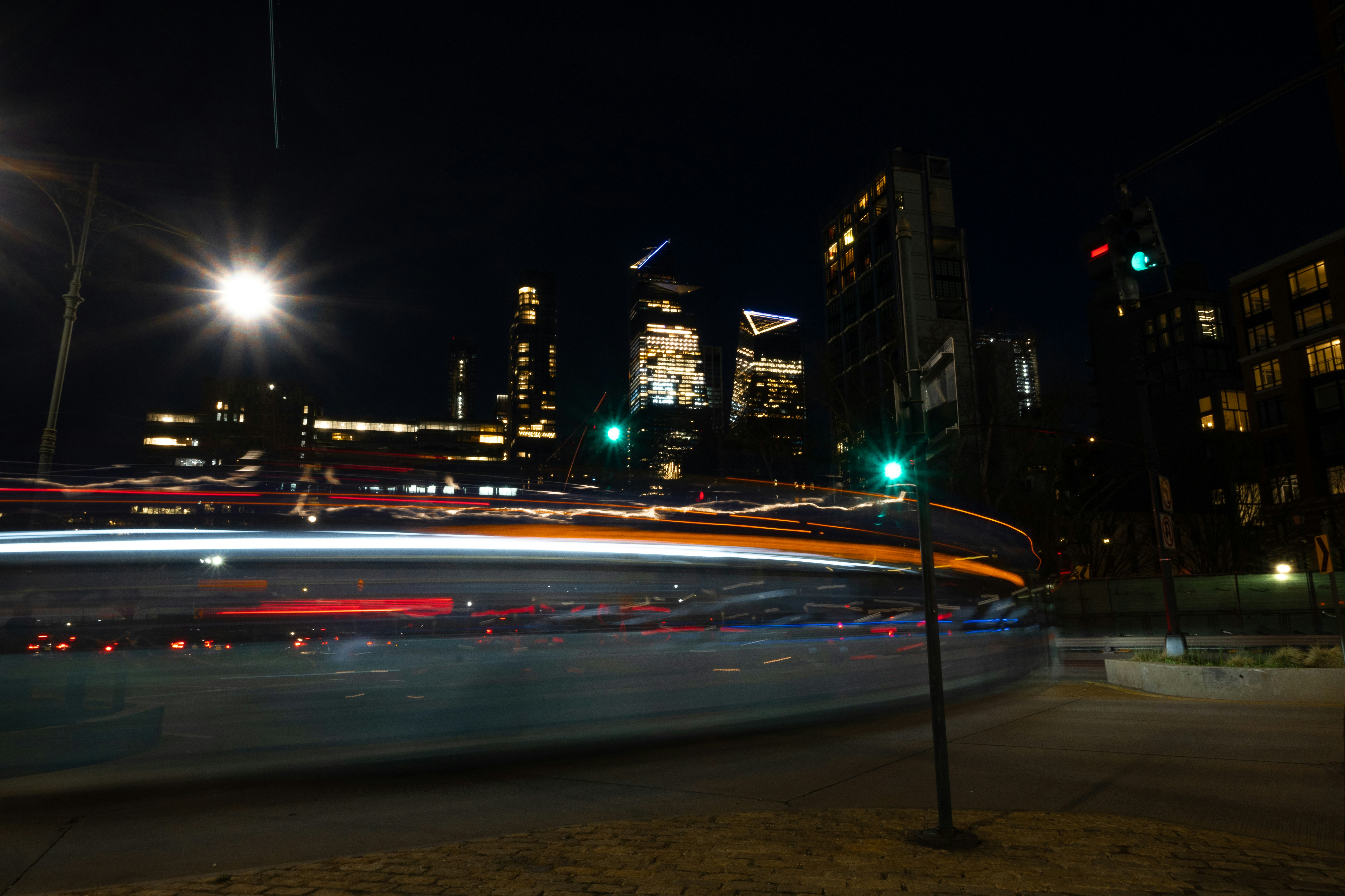 A blurry photo of a city at night photo – Free Pier 63 at hudson river ...
