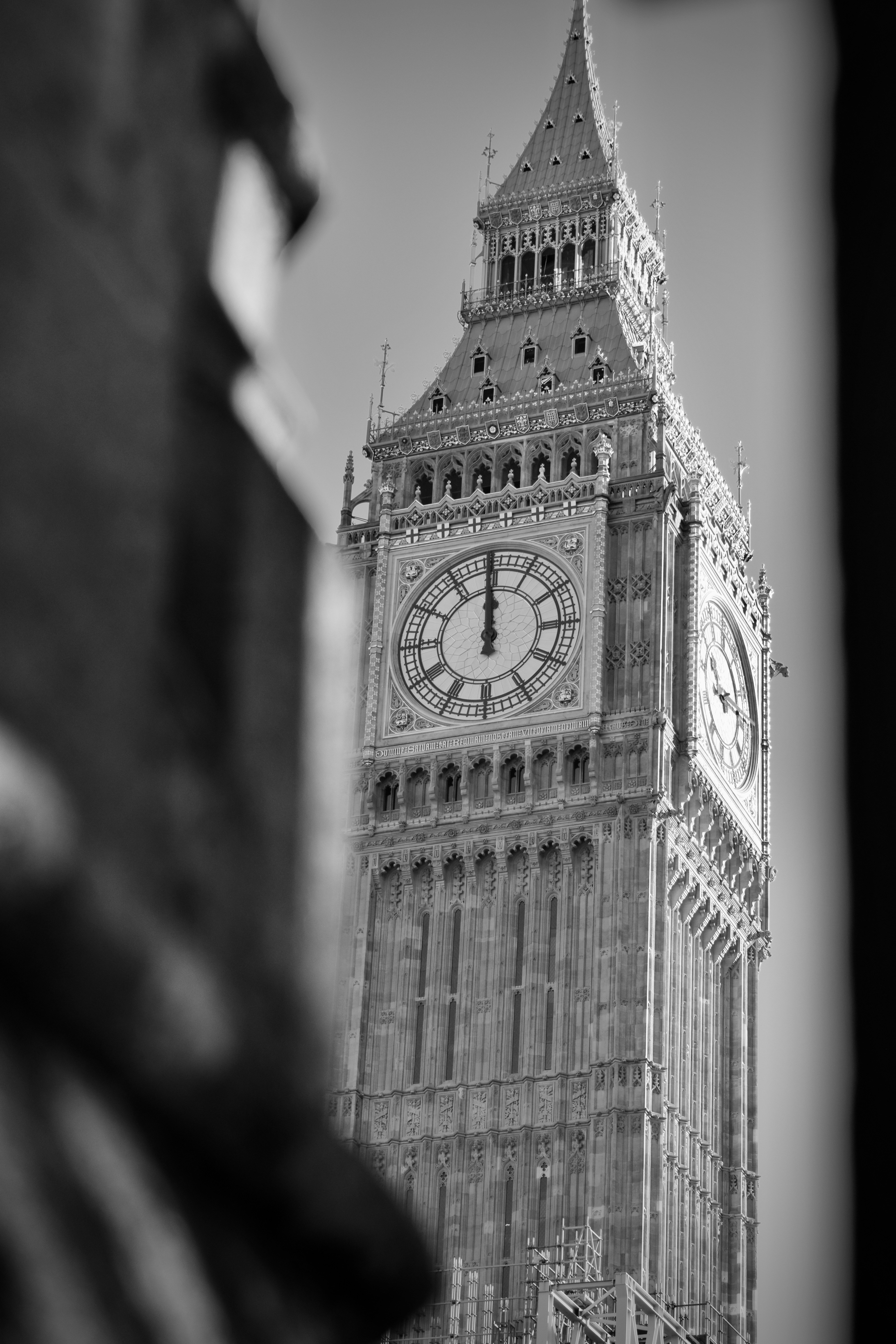 Clock Tower in Focus: A Black-and-White Portrait of Big Ben Framed by Nearby Shadows
