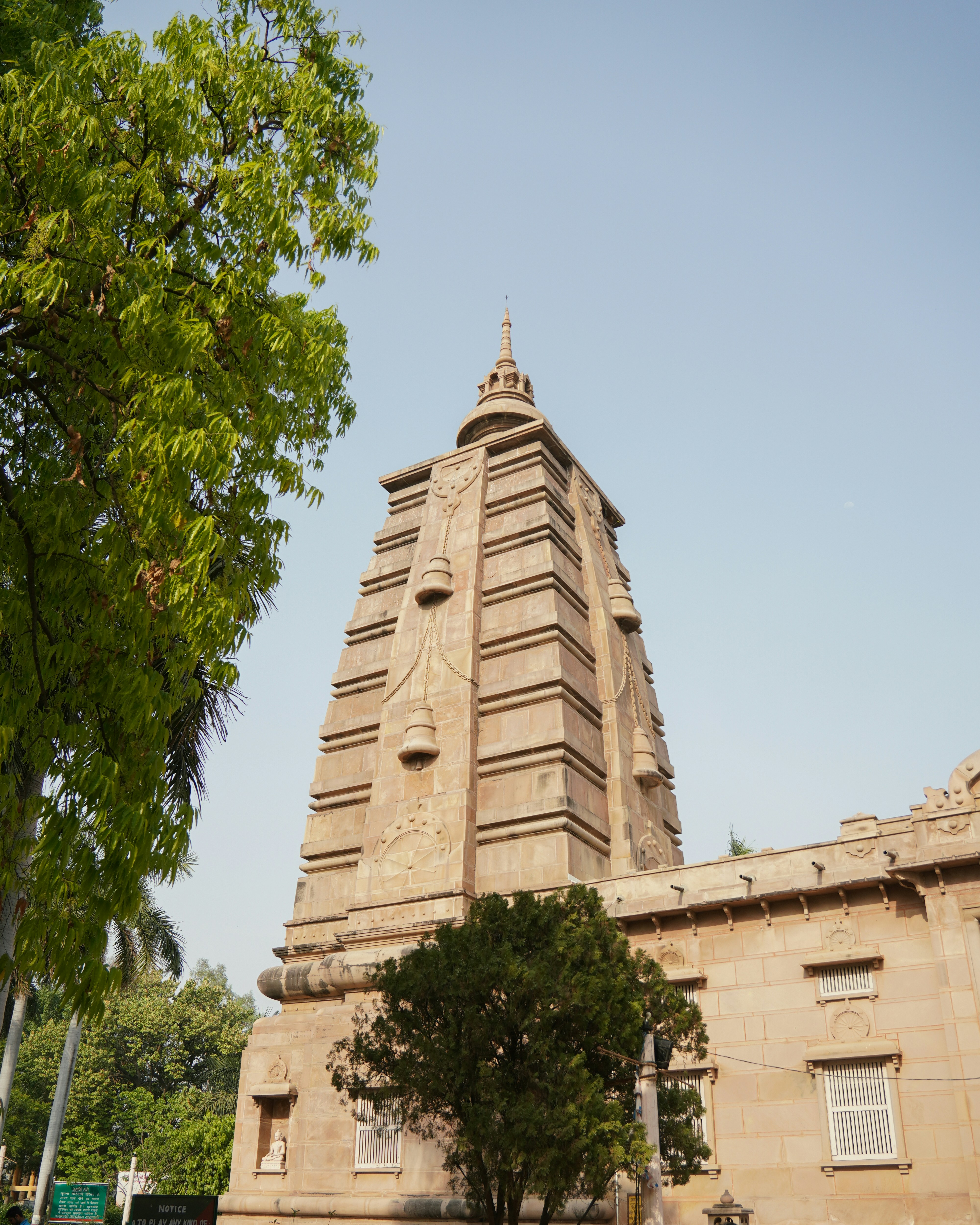 A tall tower with a clock on the top of it photo – Free Varanasi Image ...