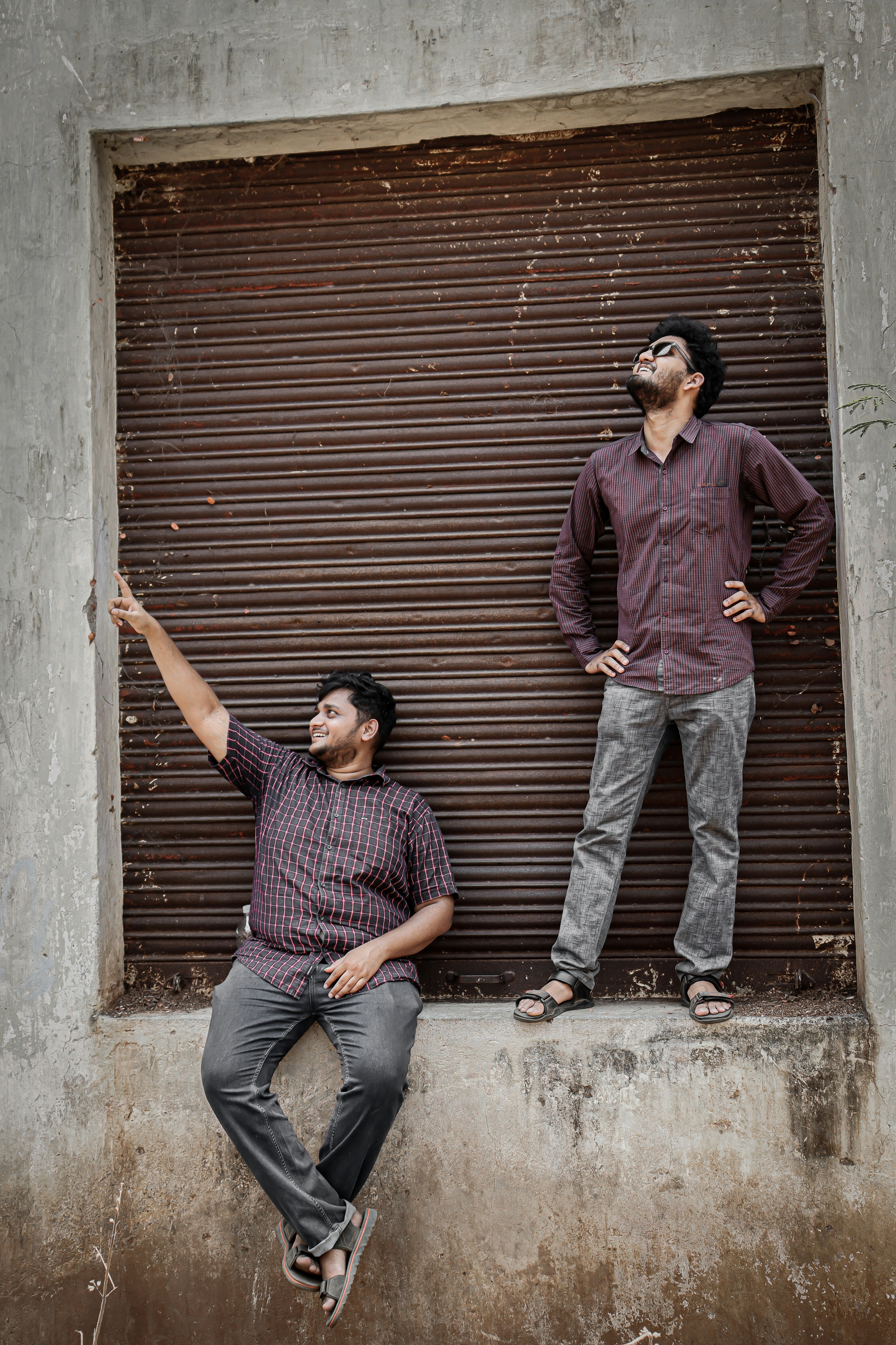 Two Friends at the Edge: A Rusted Doorframe Scene