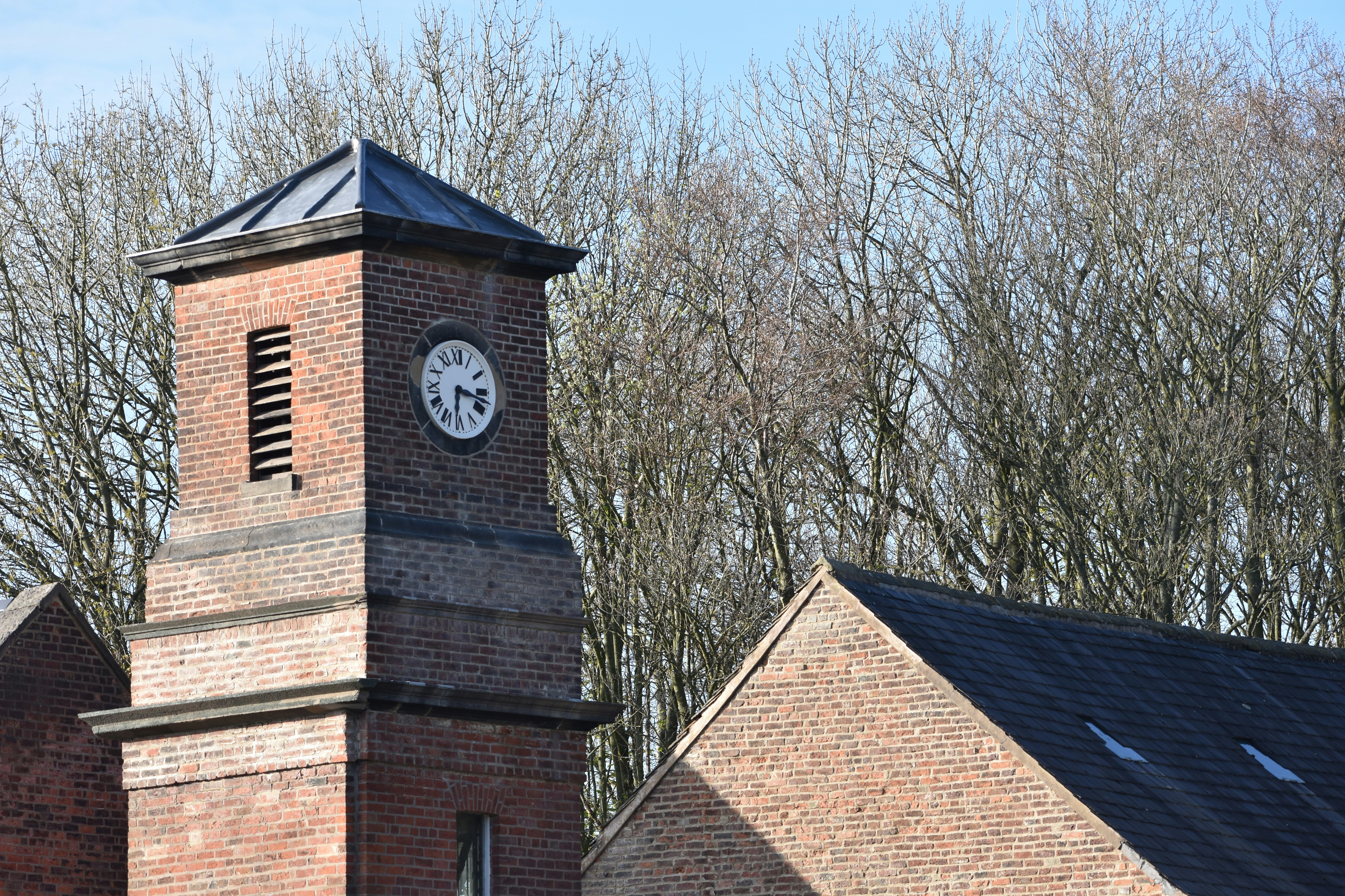 A brick tower with a clock on the top of it photo – Free Worden park ...