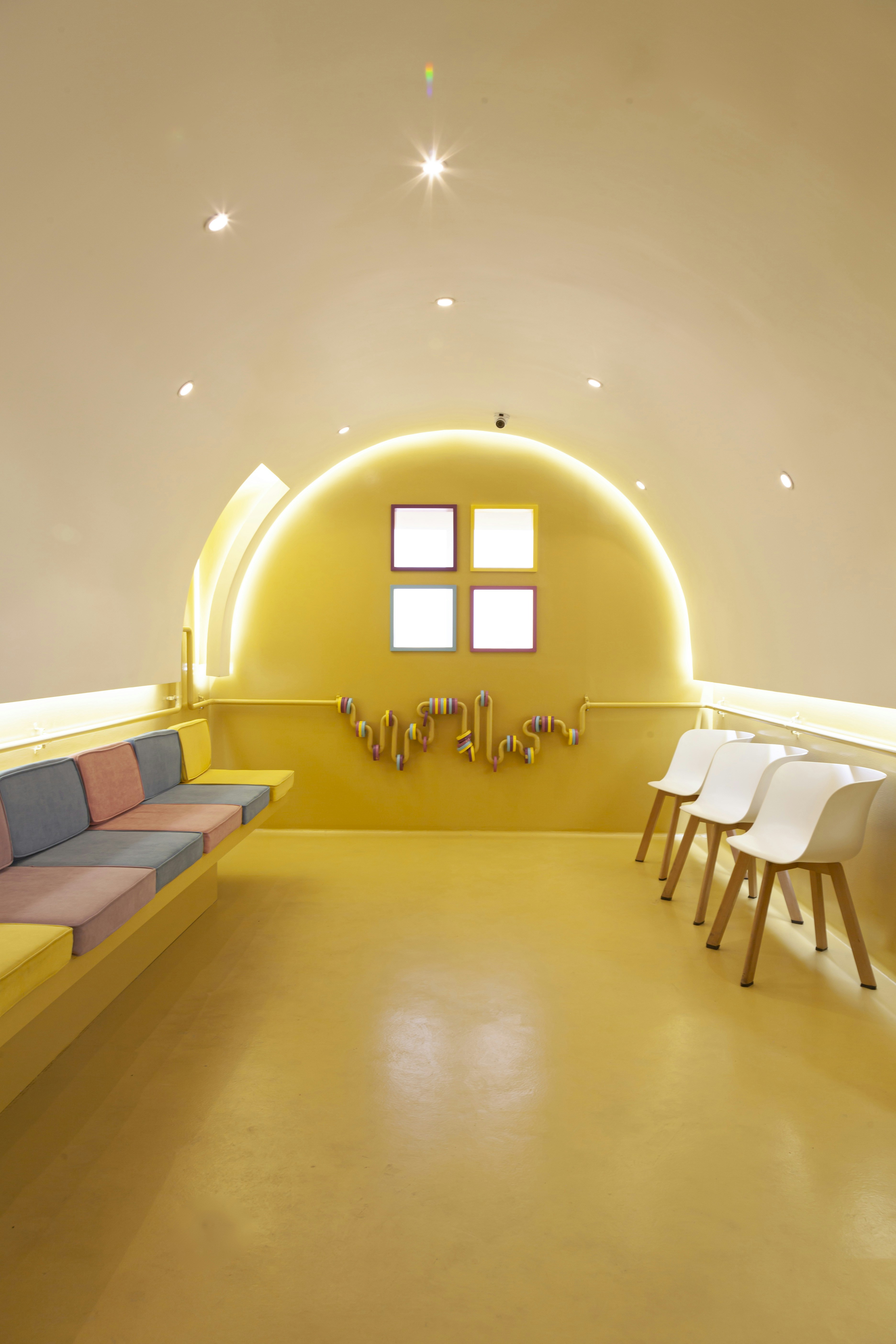 Halo Arch Glow: A Minimalist Waiting Room Bathed in Neon Light