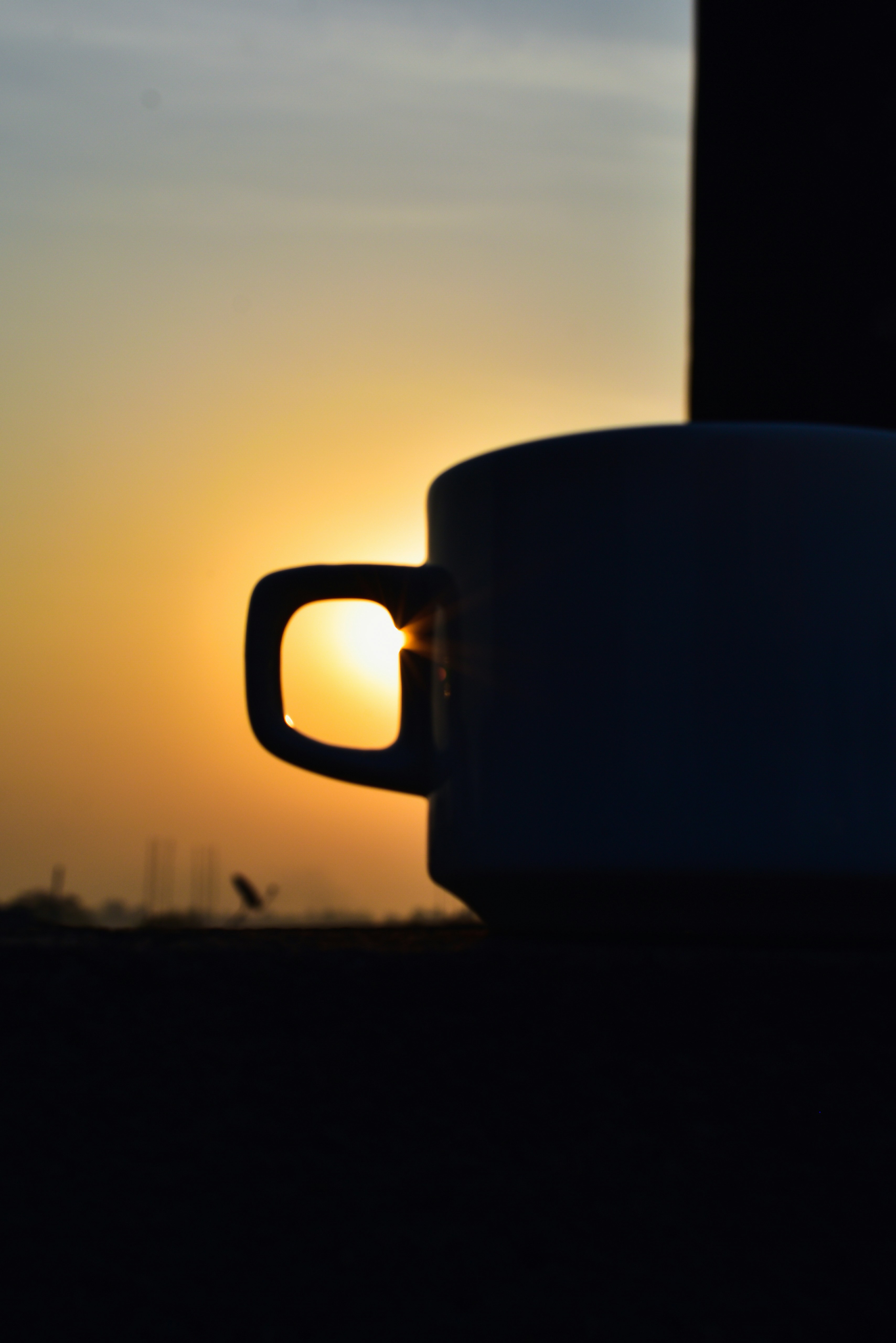 a coffee cup sitting on top of a table