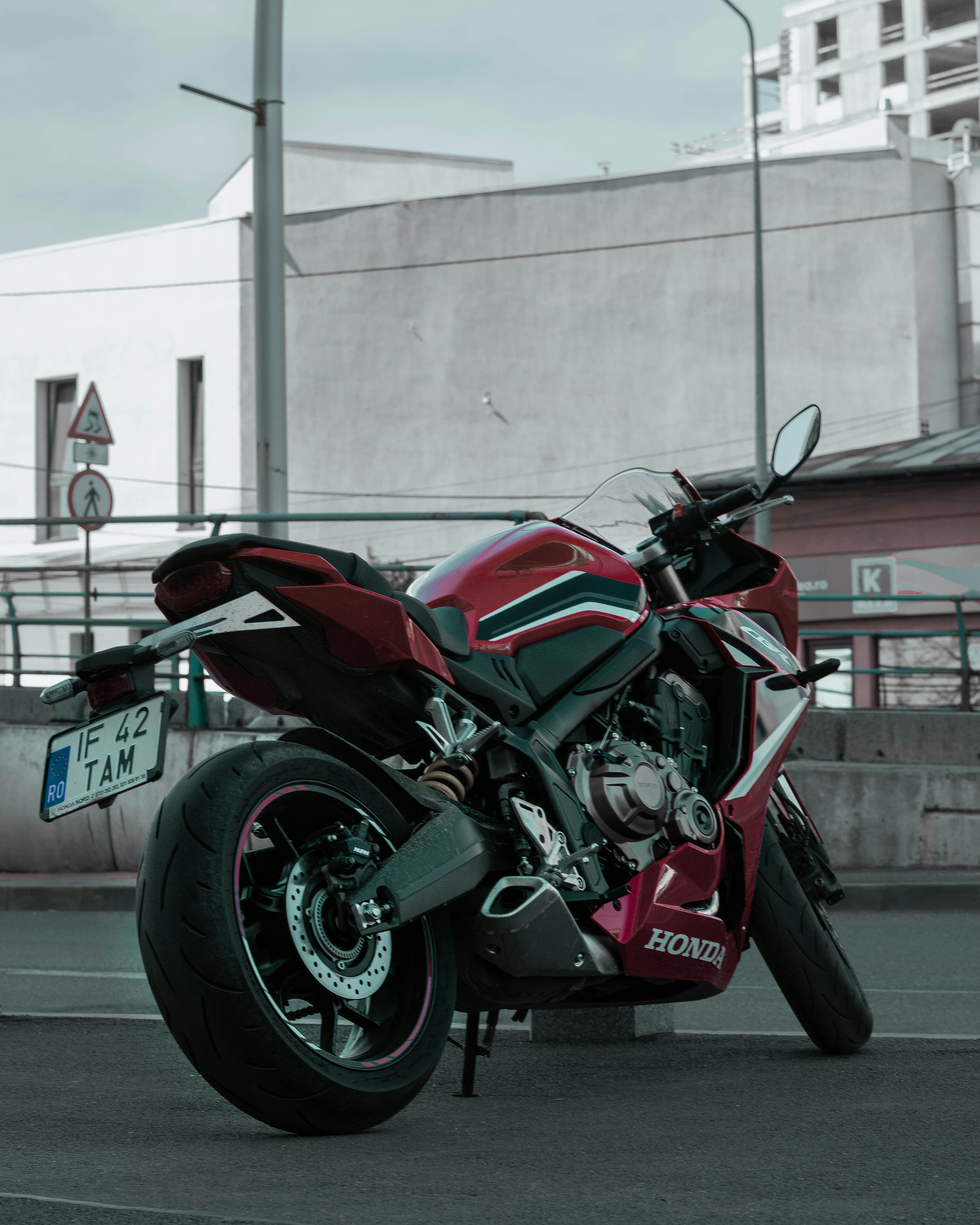 Crimson Precision: Honda CBR Resting on a Quiet City Street