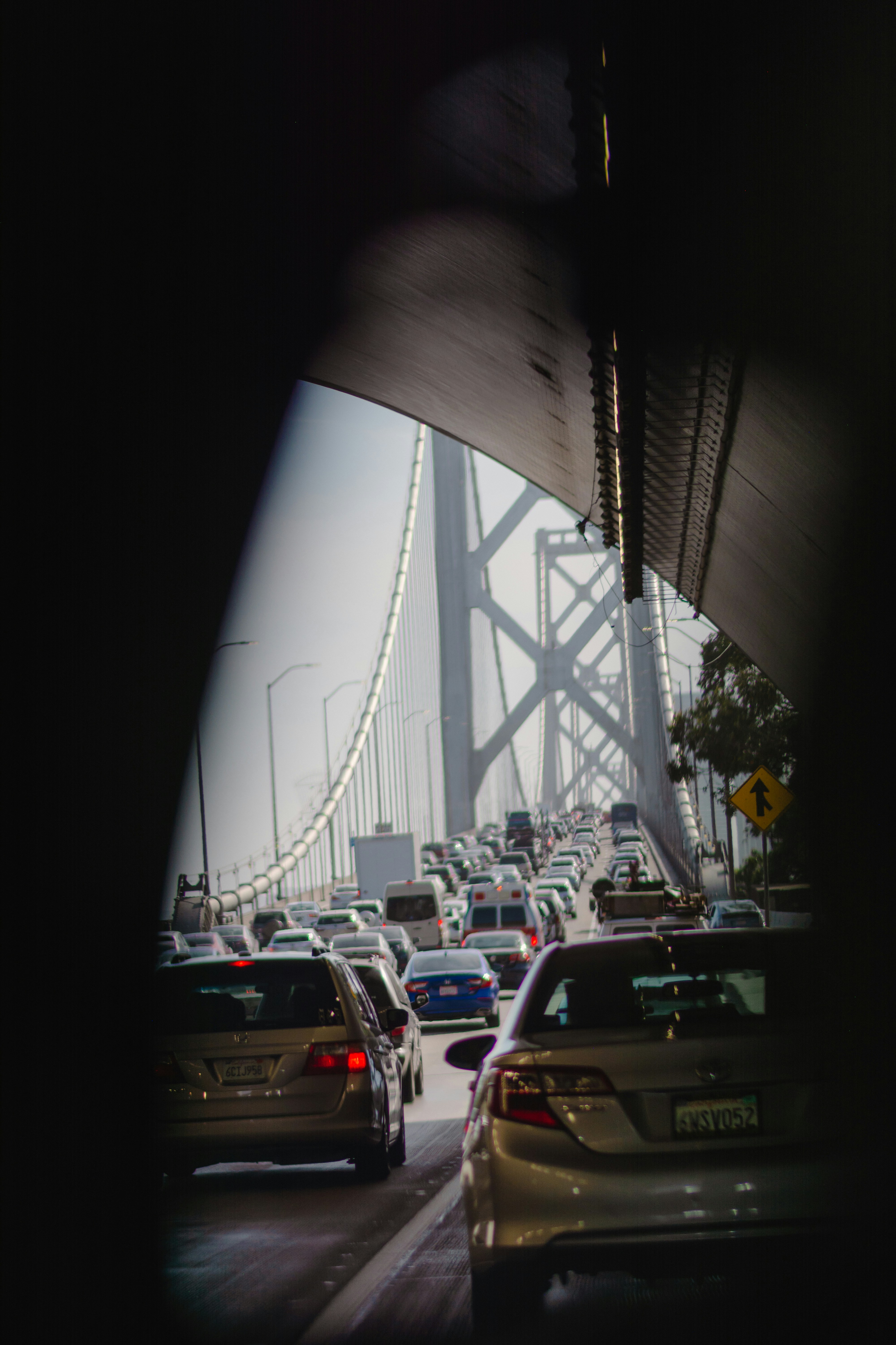 A Car-Lined Ascent: Crossing the Bay Bridge Through a Narrow Aperture