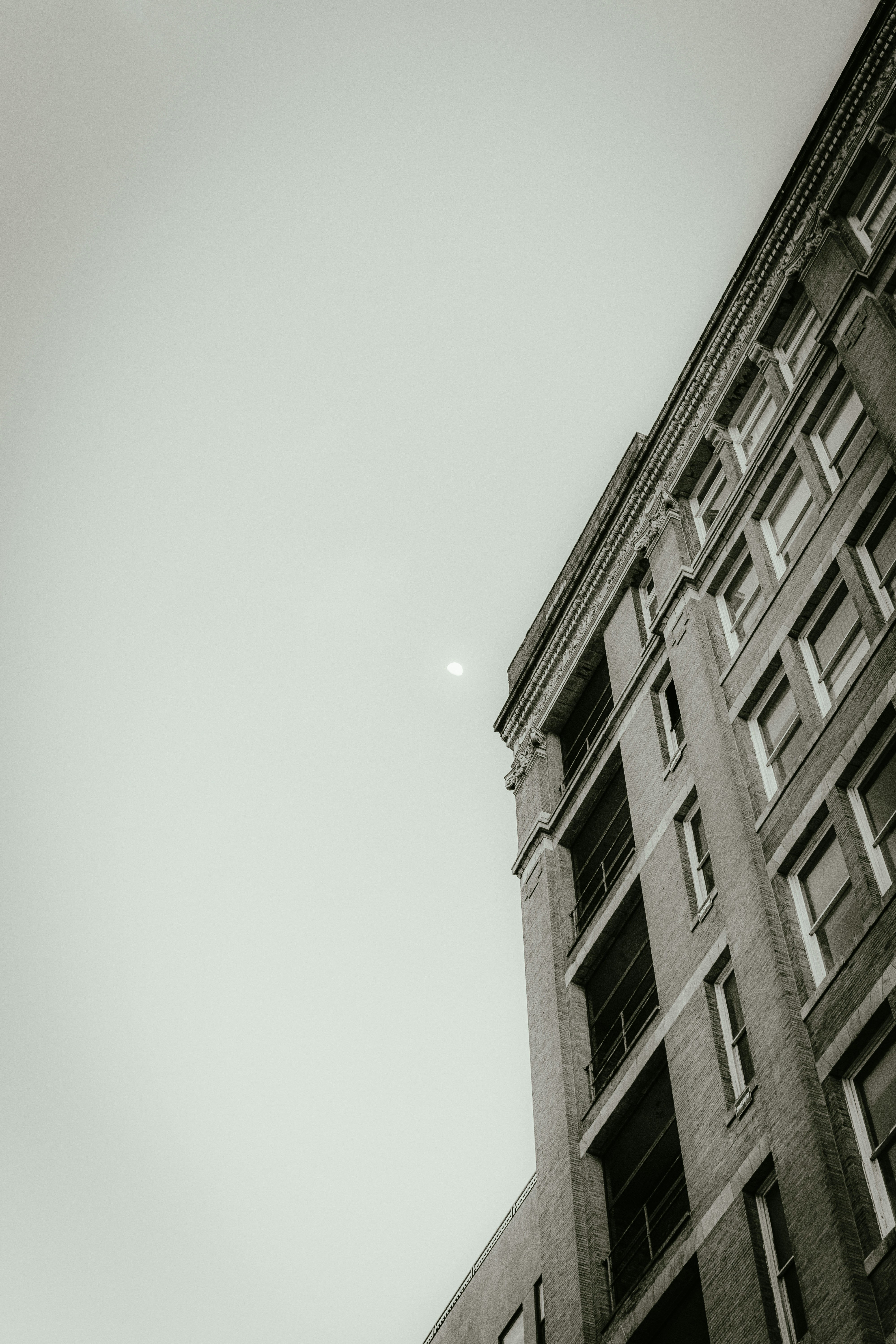 a black and white photo of a tall building