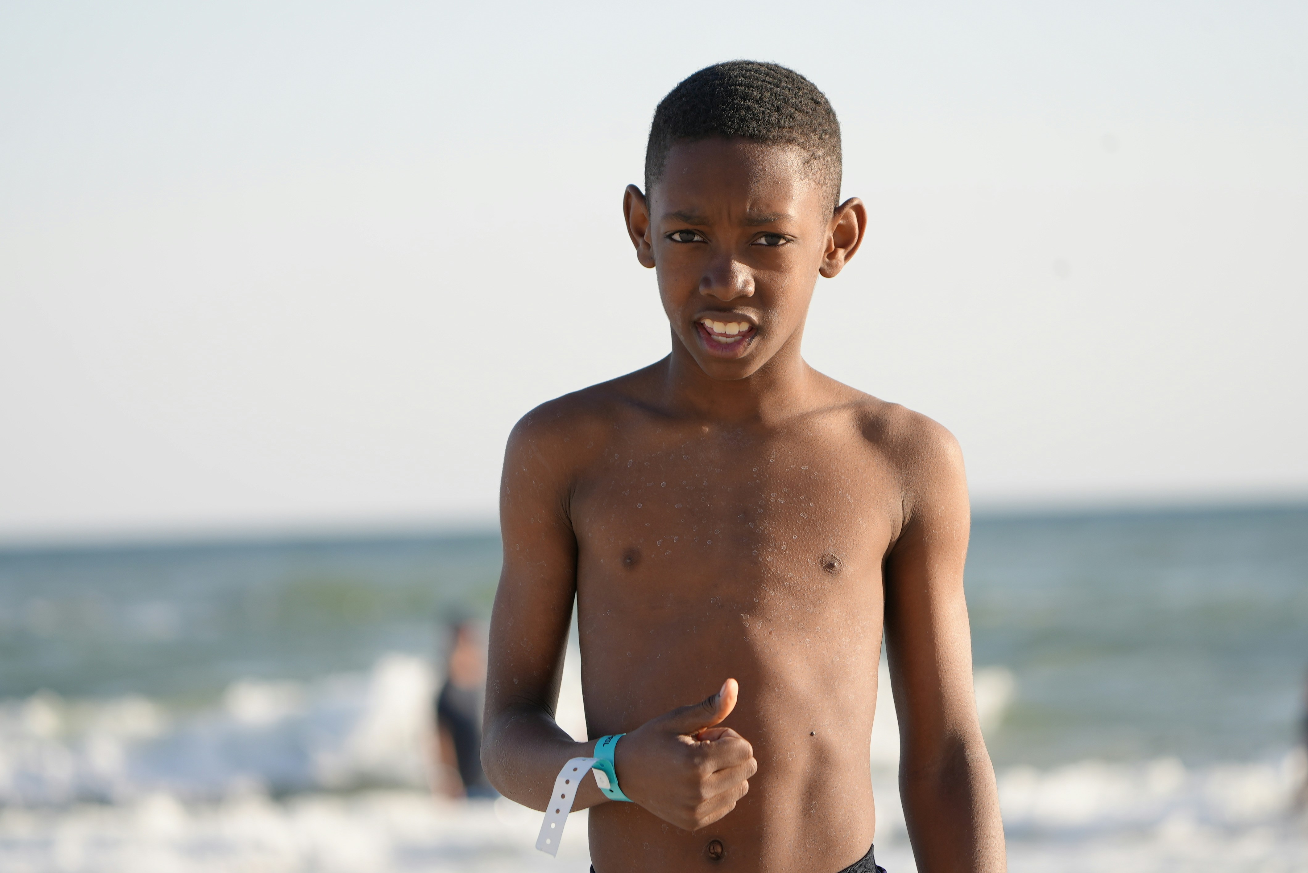 Onshore Gaze: A Beach Portrait of Quiet Confidence