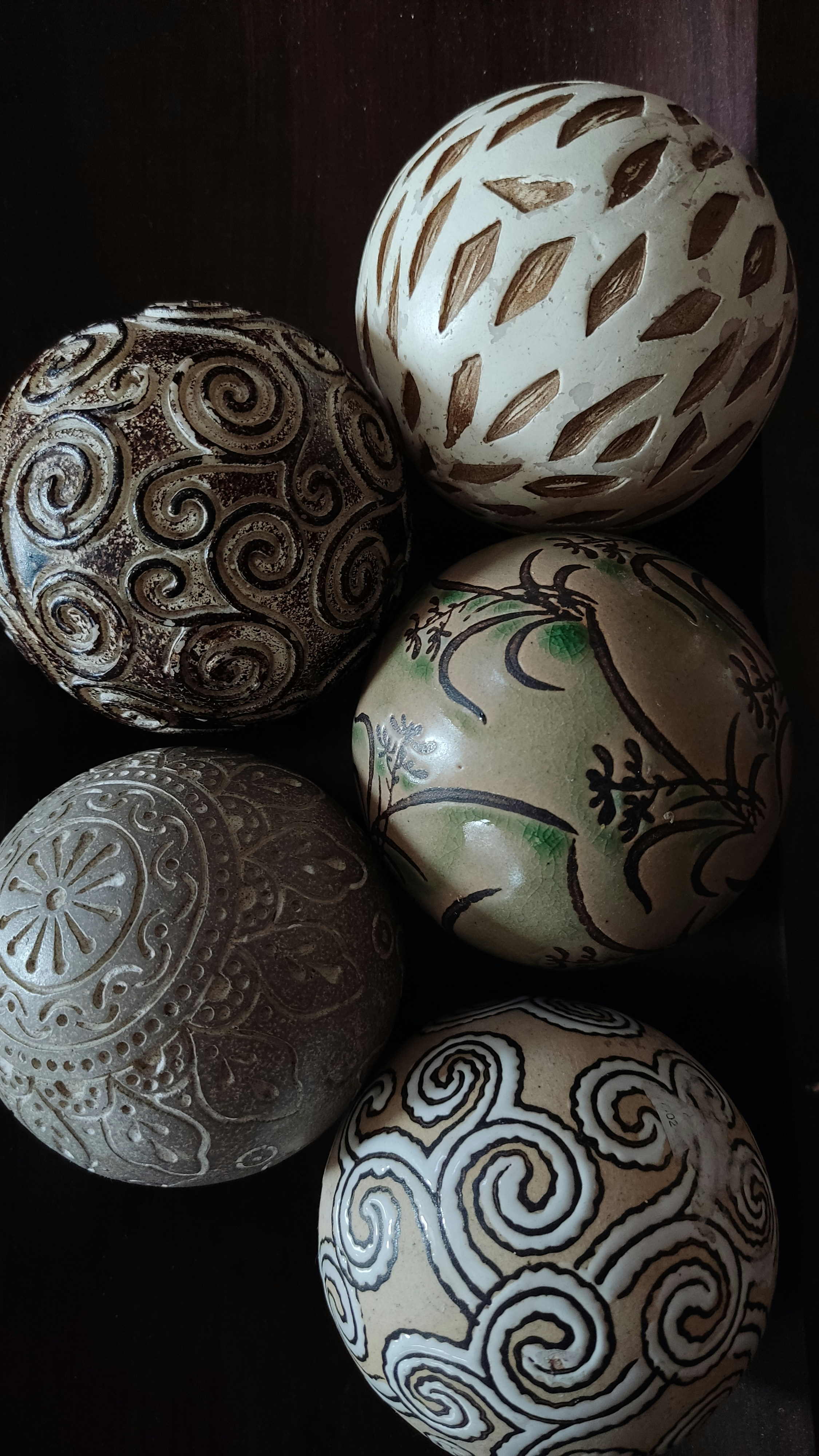 A group of four decorative eggs sitting on top of a table photo – Free ...