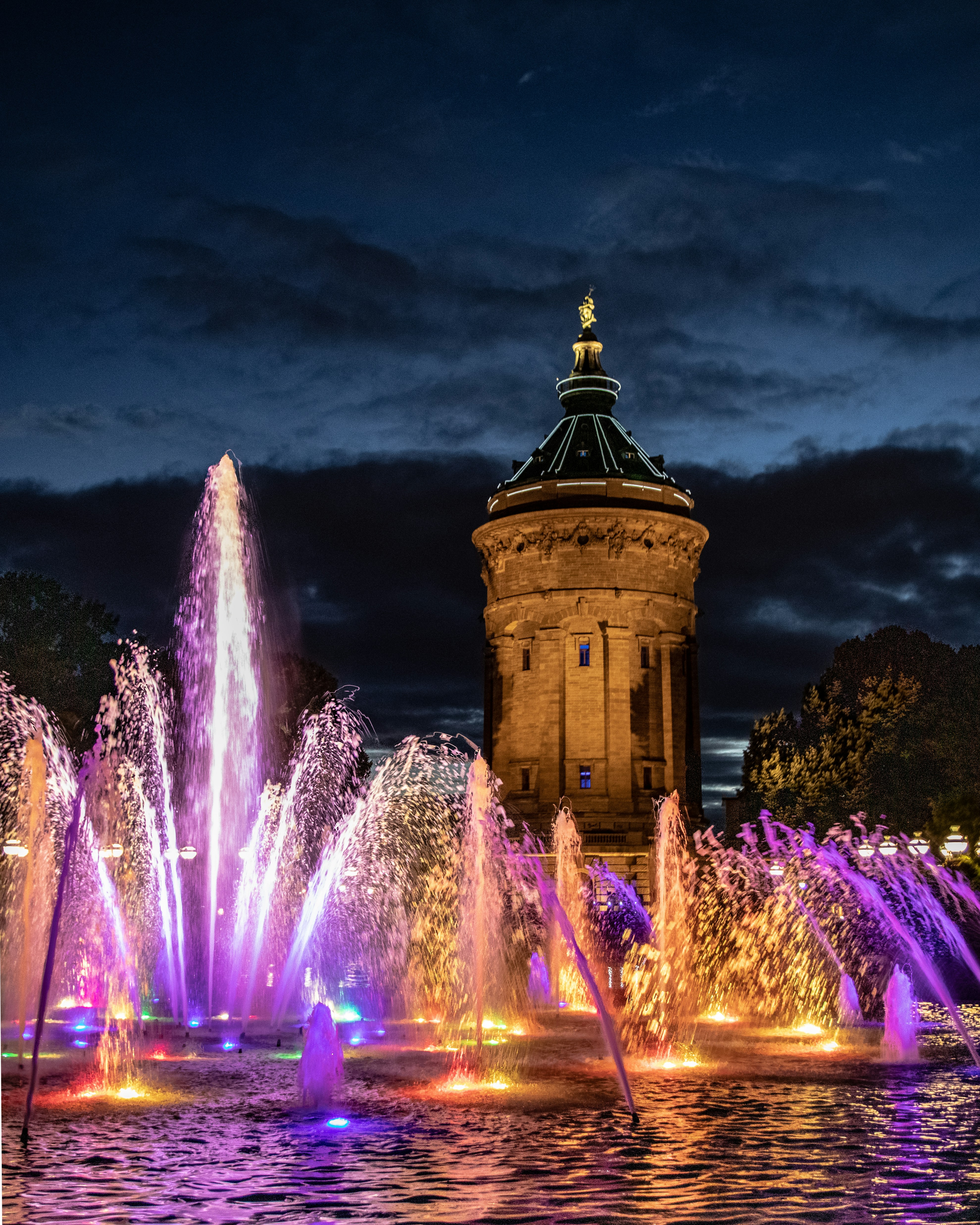Neon Fountains Beside the Rotunda at Night